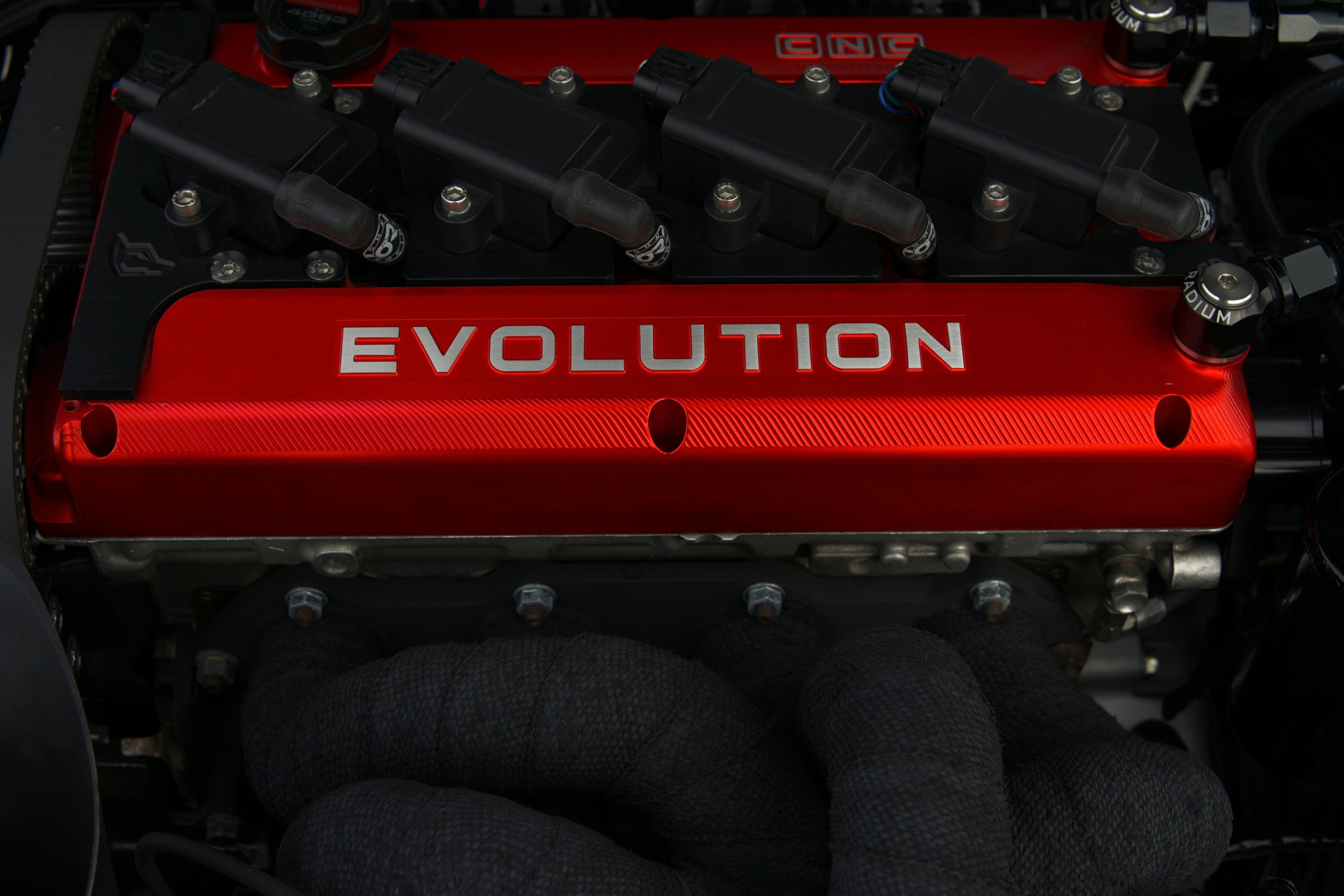 Engineered Sip of Speed: The Red Valve Cover of Evolution
