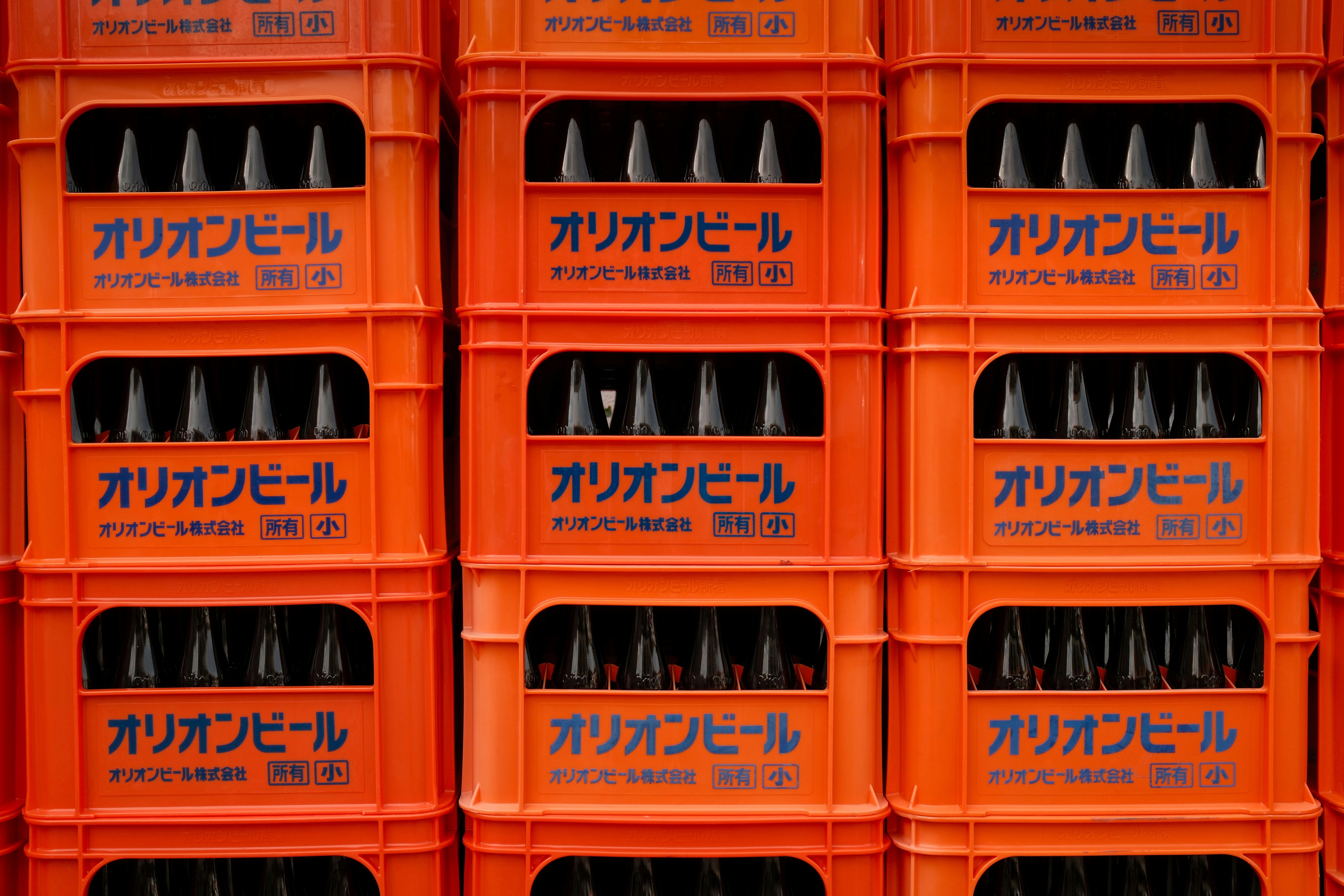 Stacked Orange Crates: Repeating Portraits of Availability