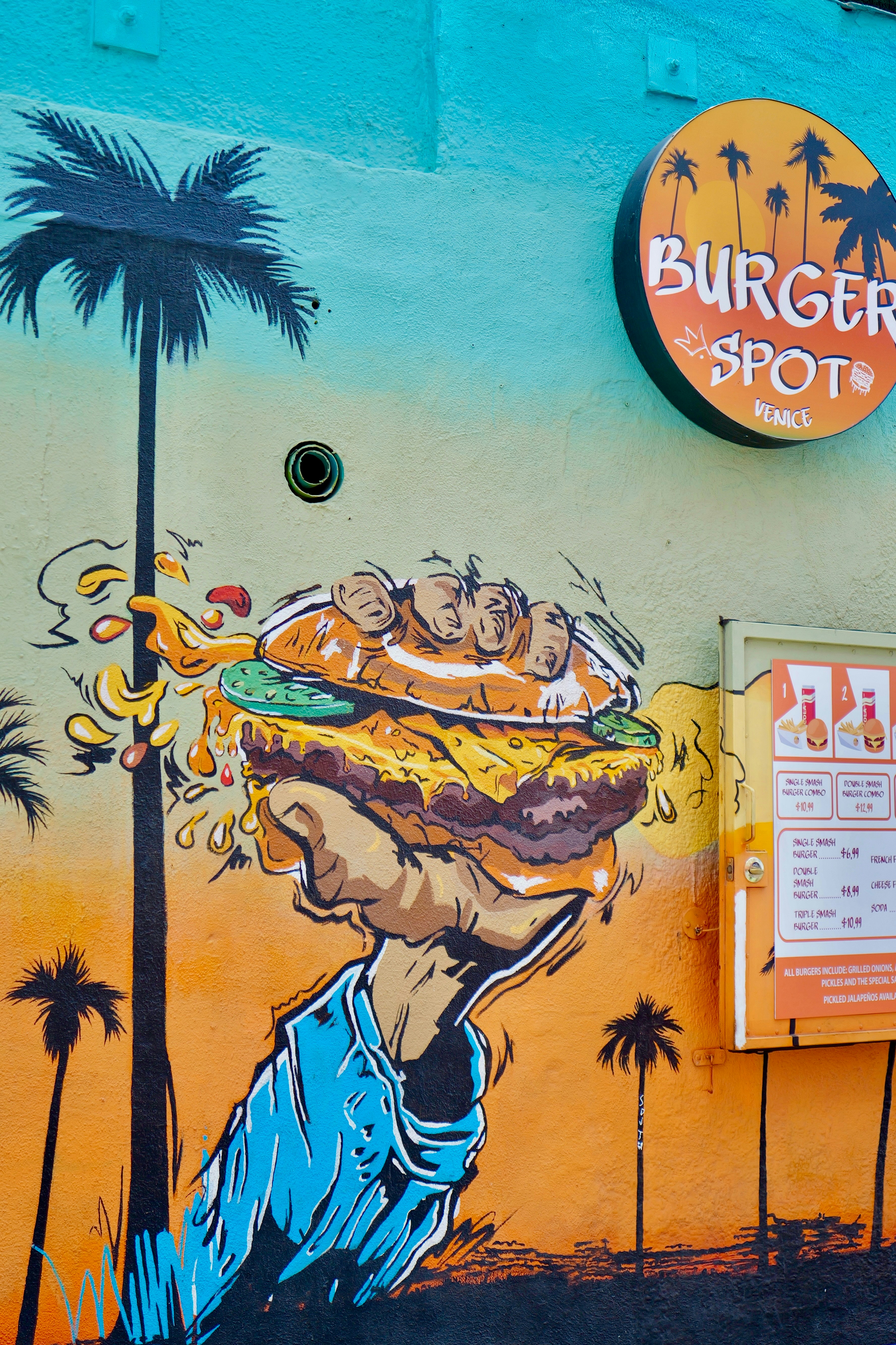 Hamburger in the Desert Sky: A Splash of Venice on a Wall
