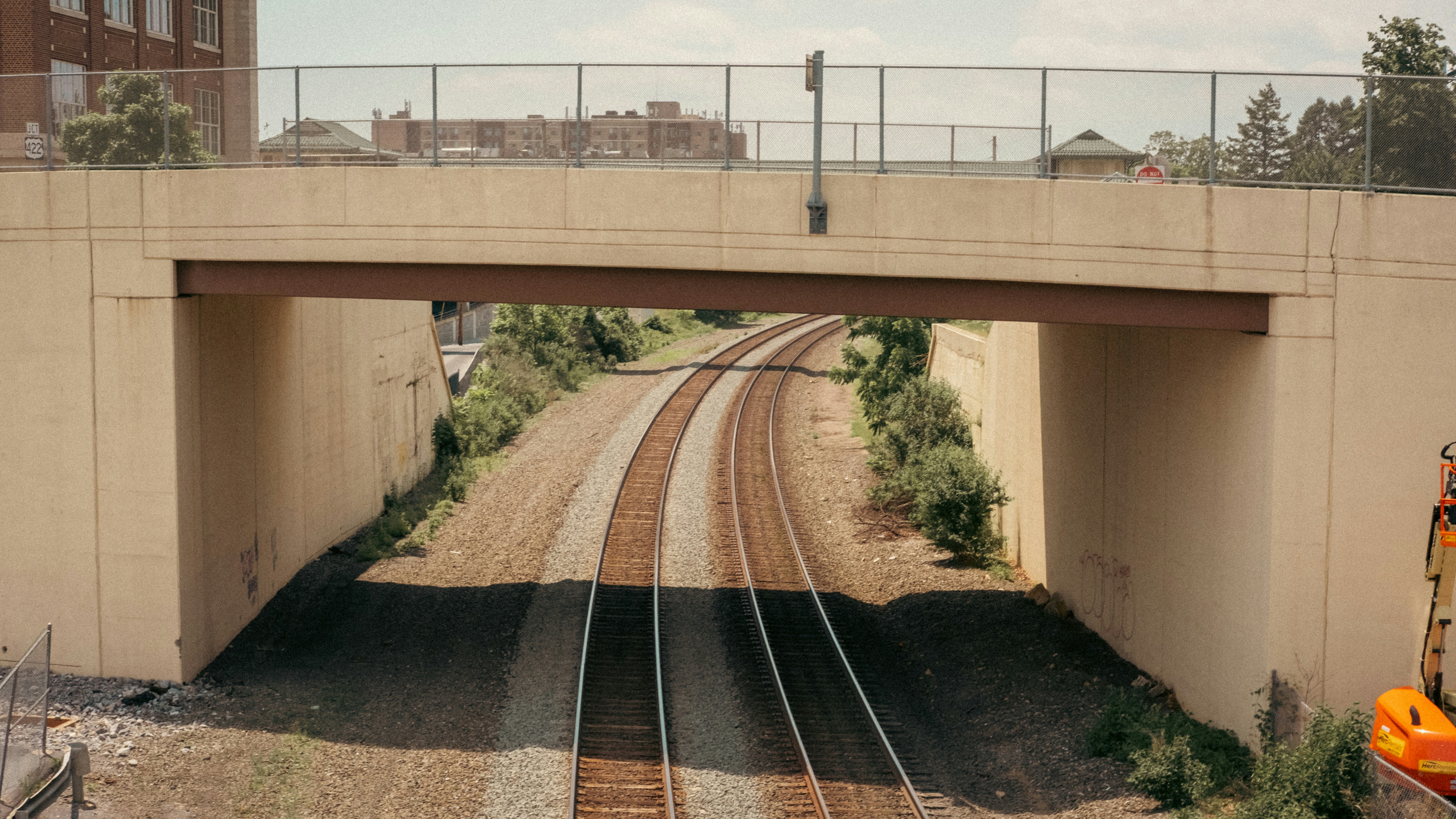 Rails Through the Underpass: A Quiet Underbridge Corridor