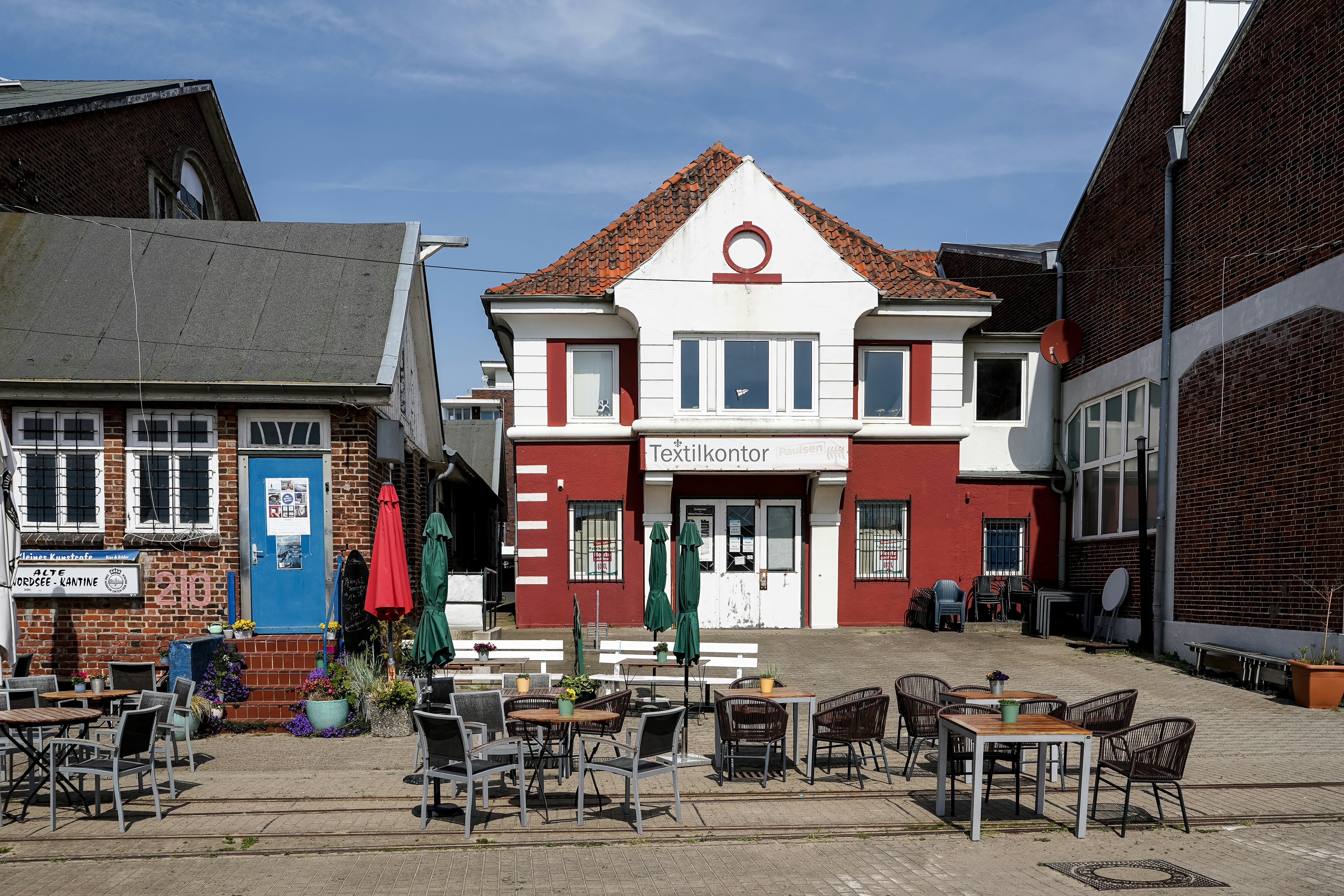 Textilkontor Café Courtyard Under a Bright Danish Sky