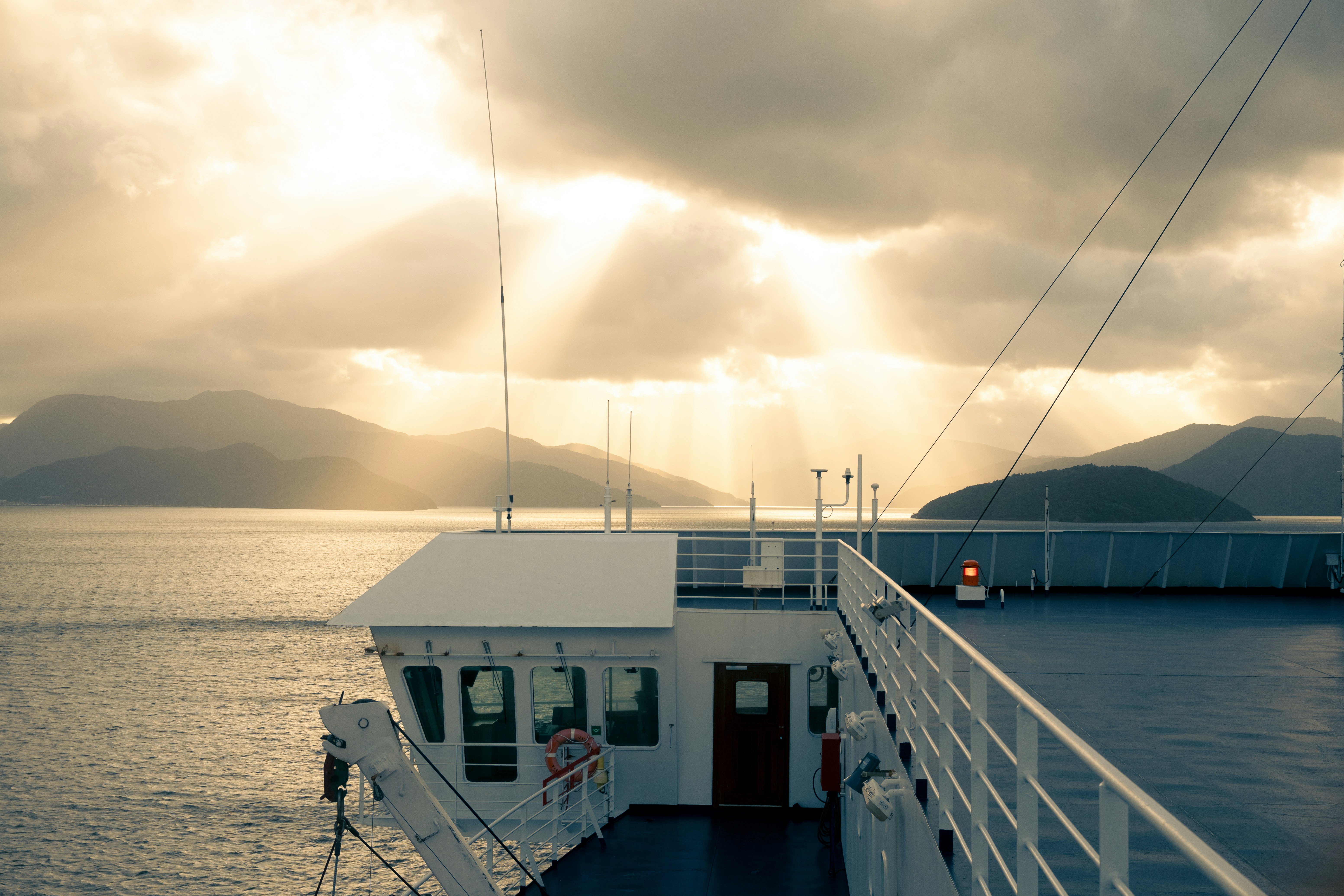Sunbeams on the Bridge: A Quiet Moment at Sea