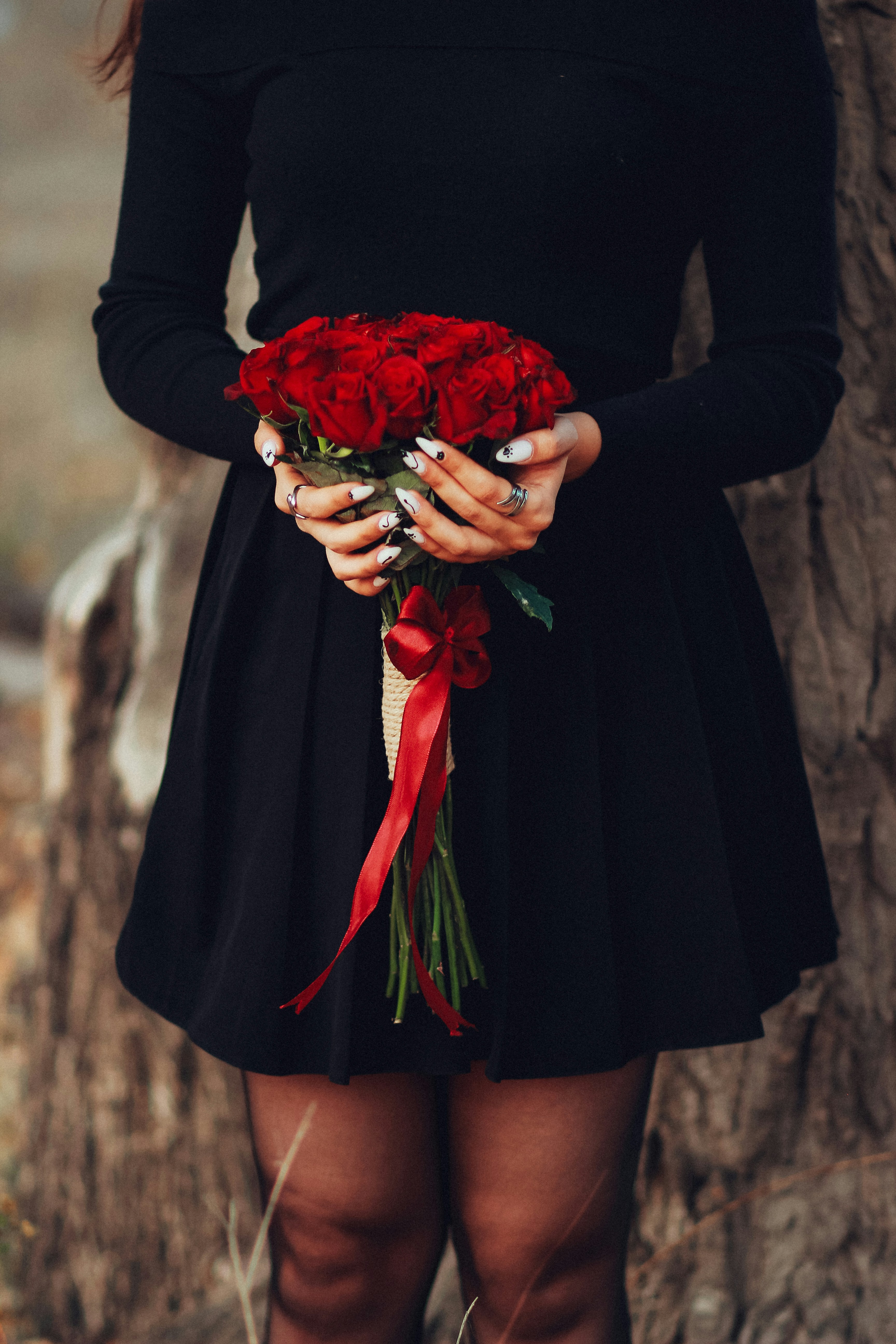 Bouquet of Red Roses Clasped in a Velvet Night