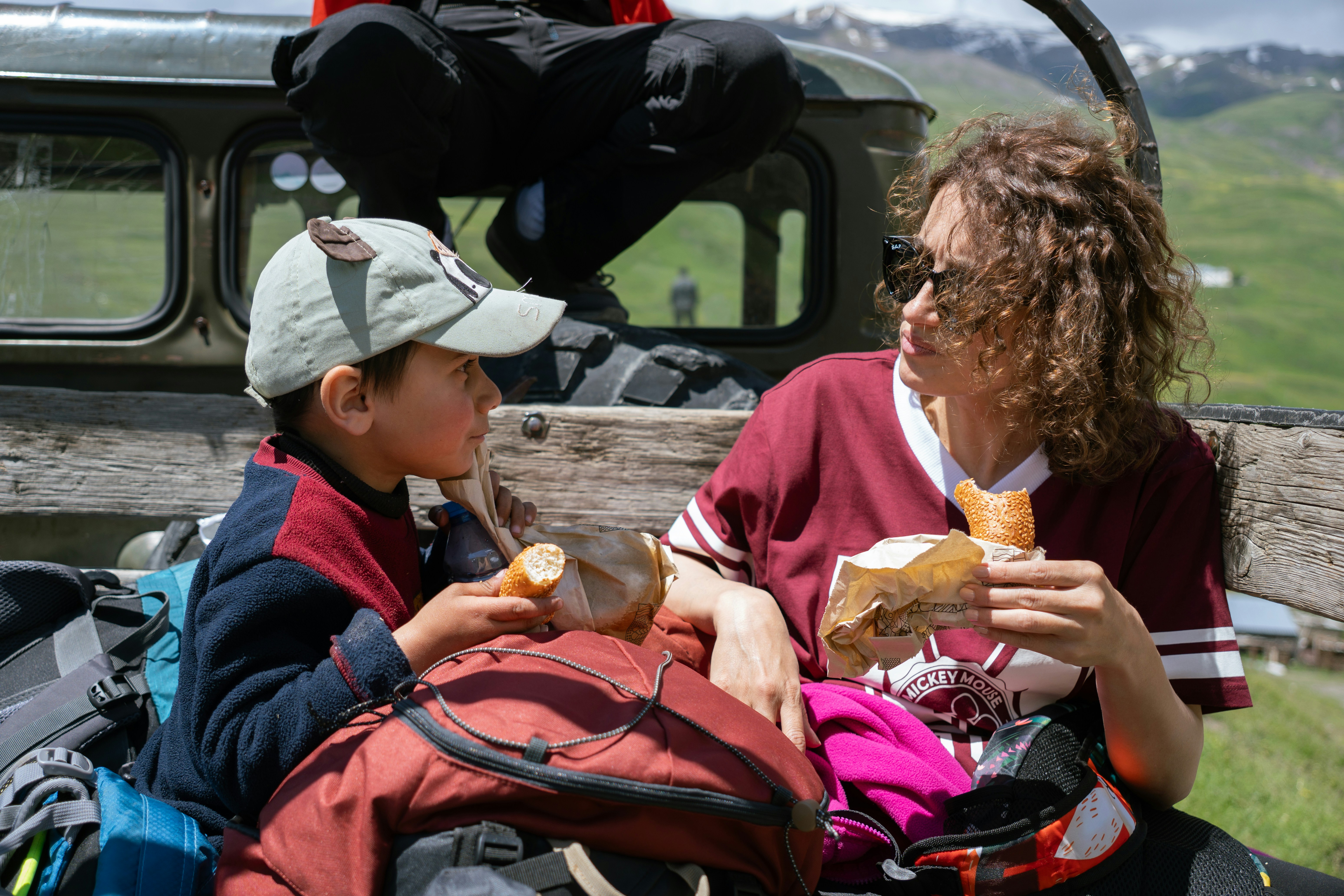 Shared Snack Break on a Rustic Train Car