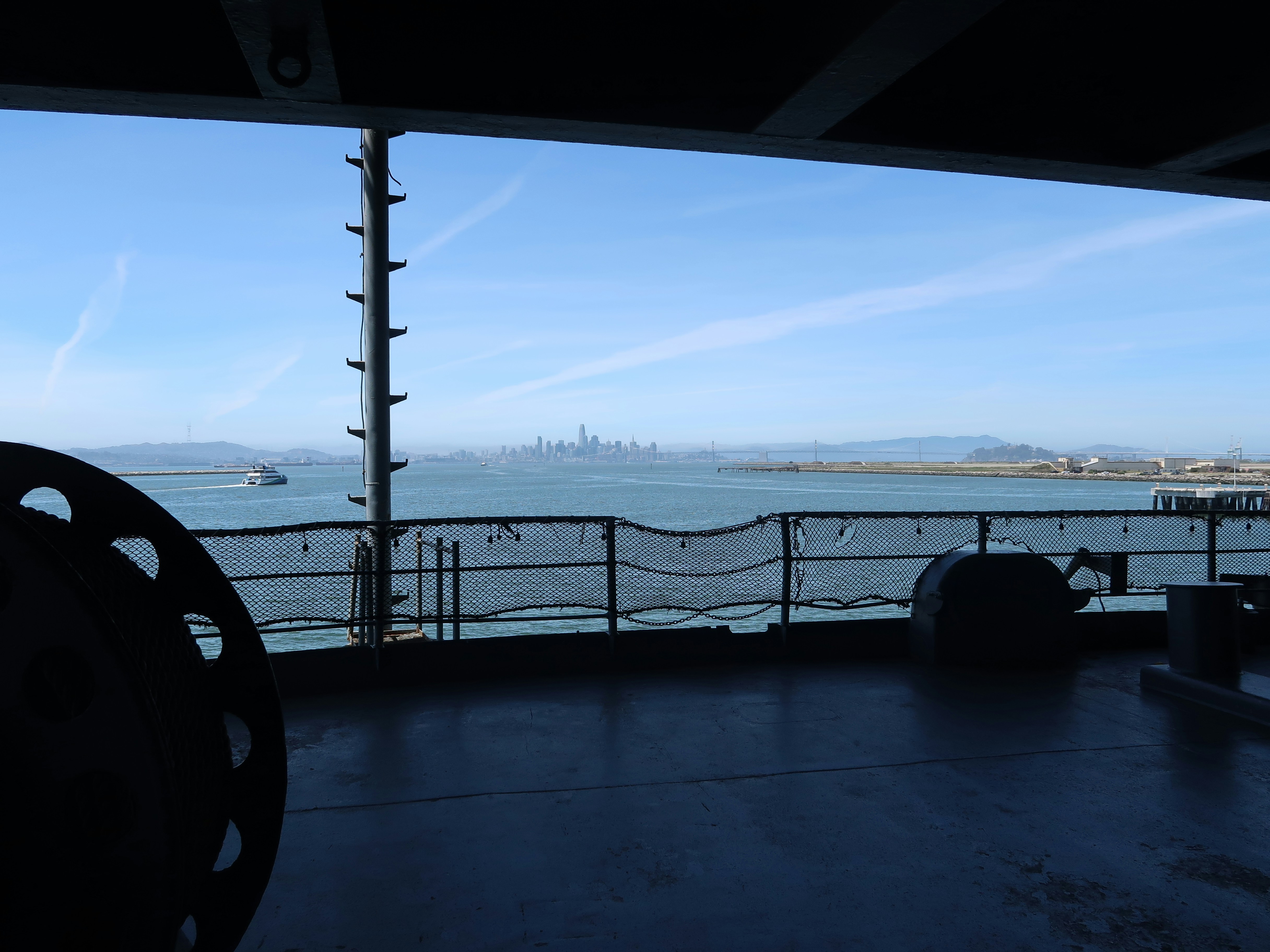 Harbor View from a Covered Deck: Distant Skyline on a Calm Day