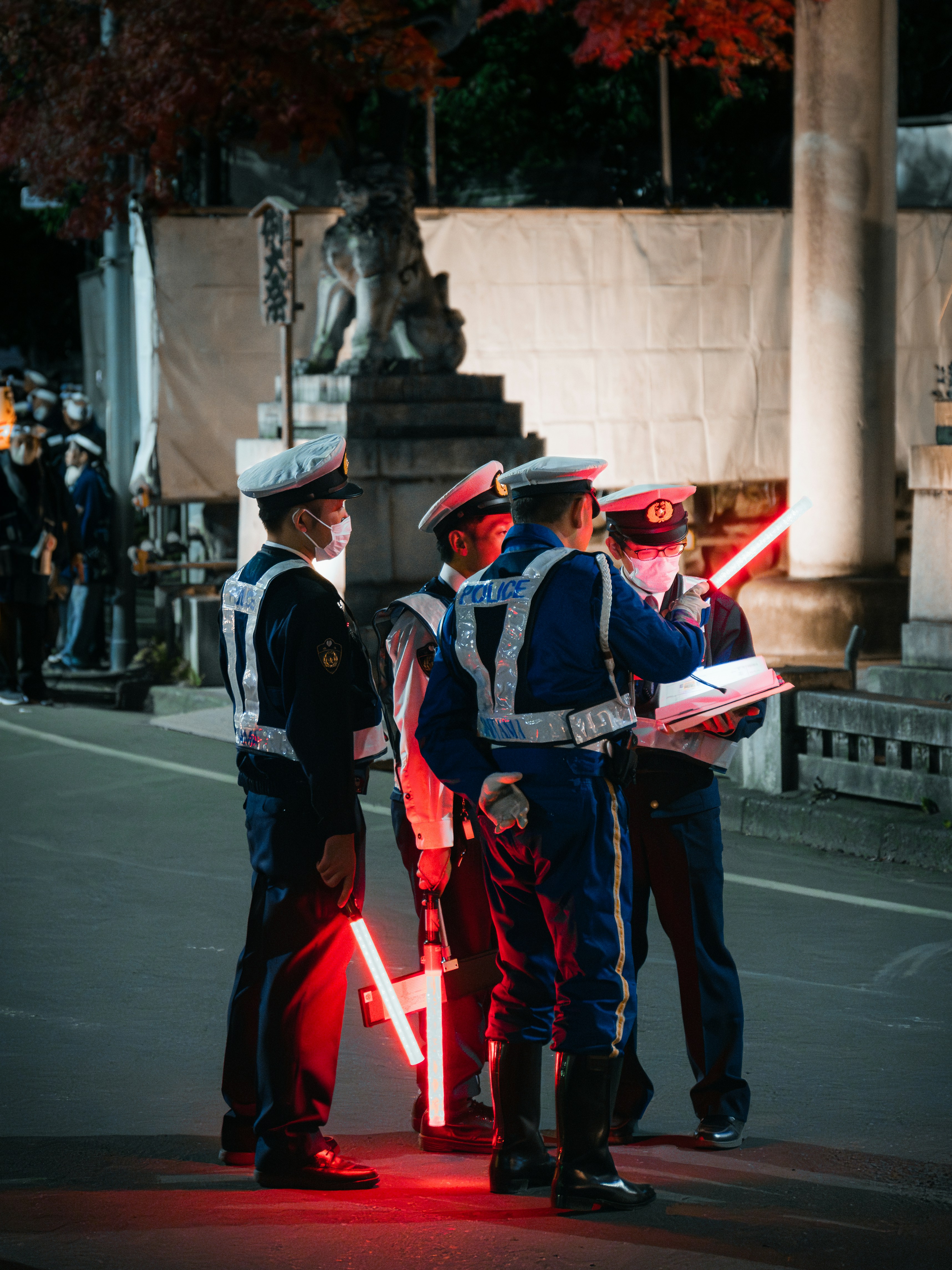 Night Parade: Neon Glow on a Line of Officers