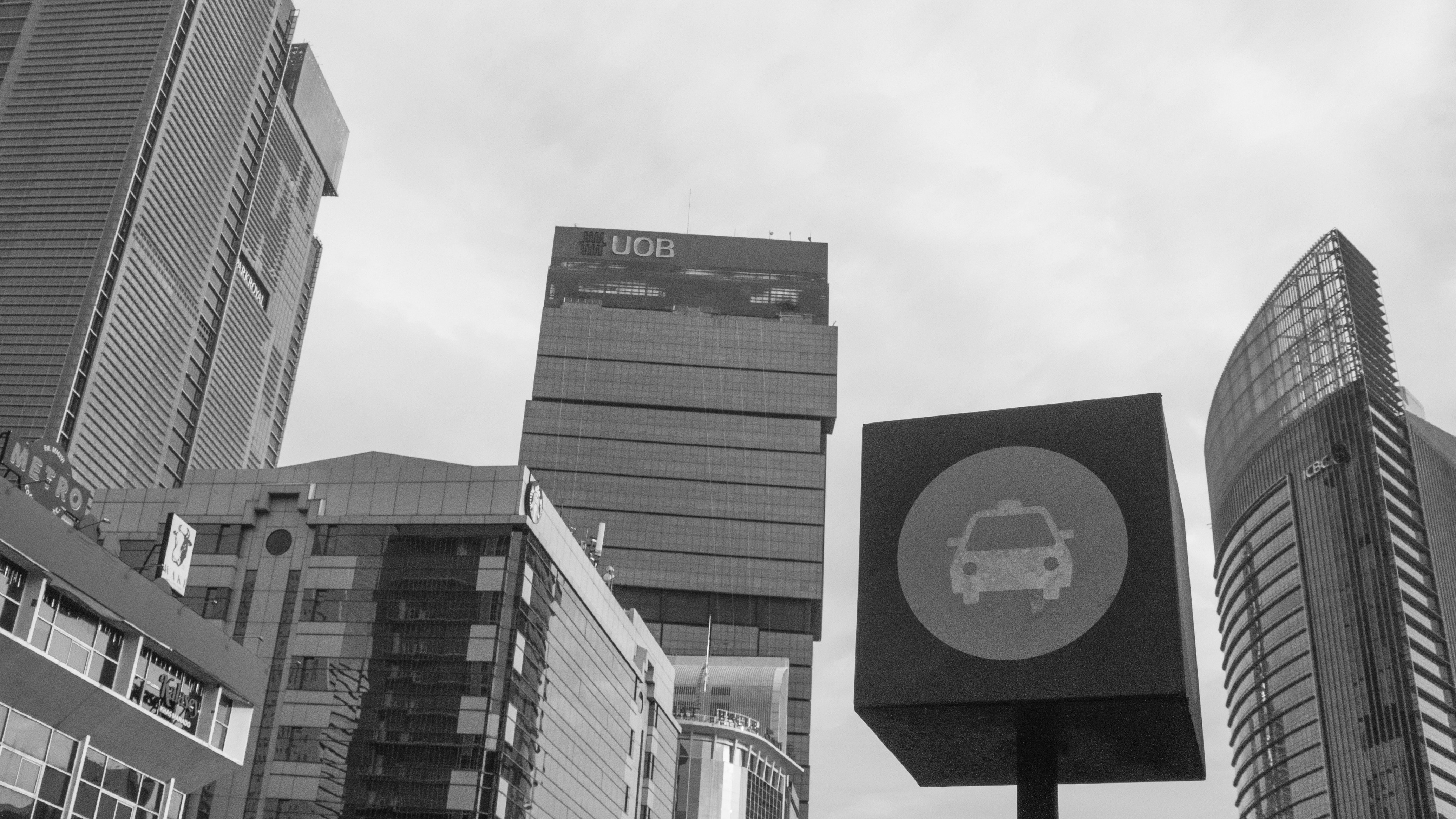 Urban Monoliths: A grayscale cityscape under a pale sky