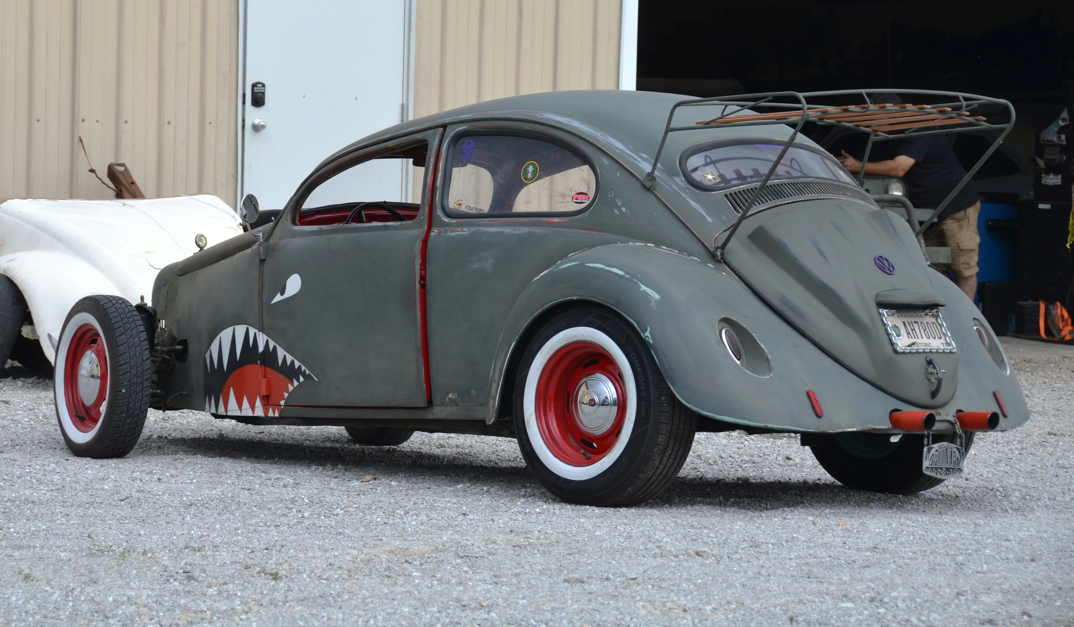 Vintage Beetle in Grayscale: Shark-mouth Detailing and Red-Wheel Accent
