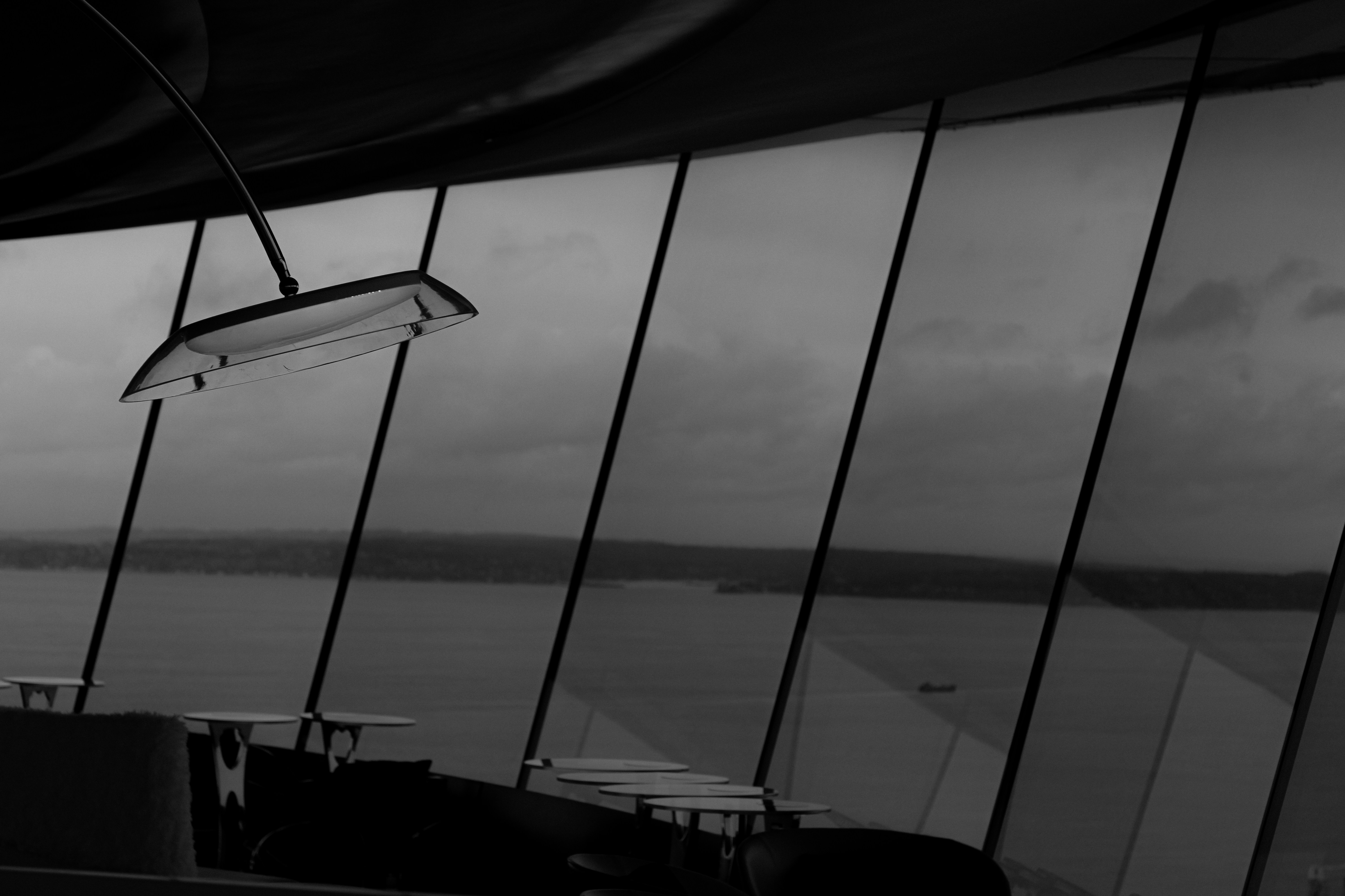 Glass Walls, Quiet Horizon: A Dusk Wave Inside a Modern Space