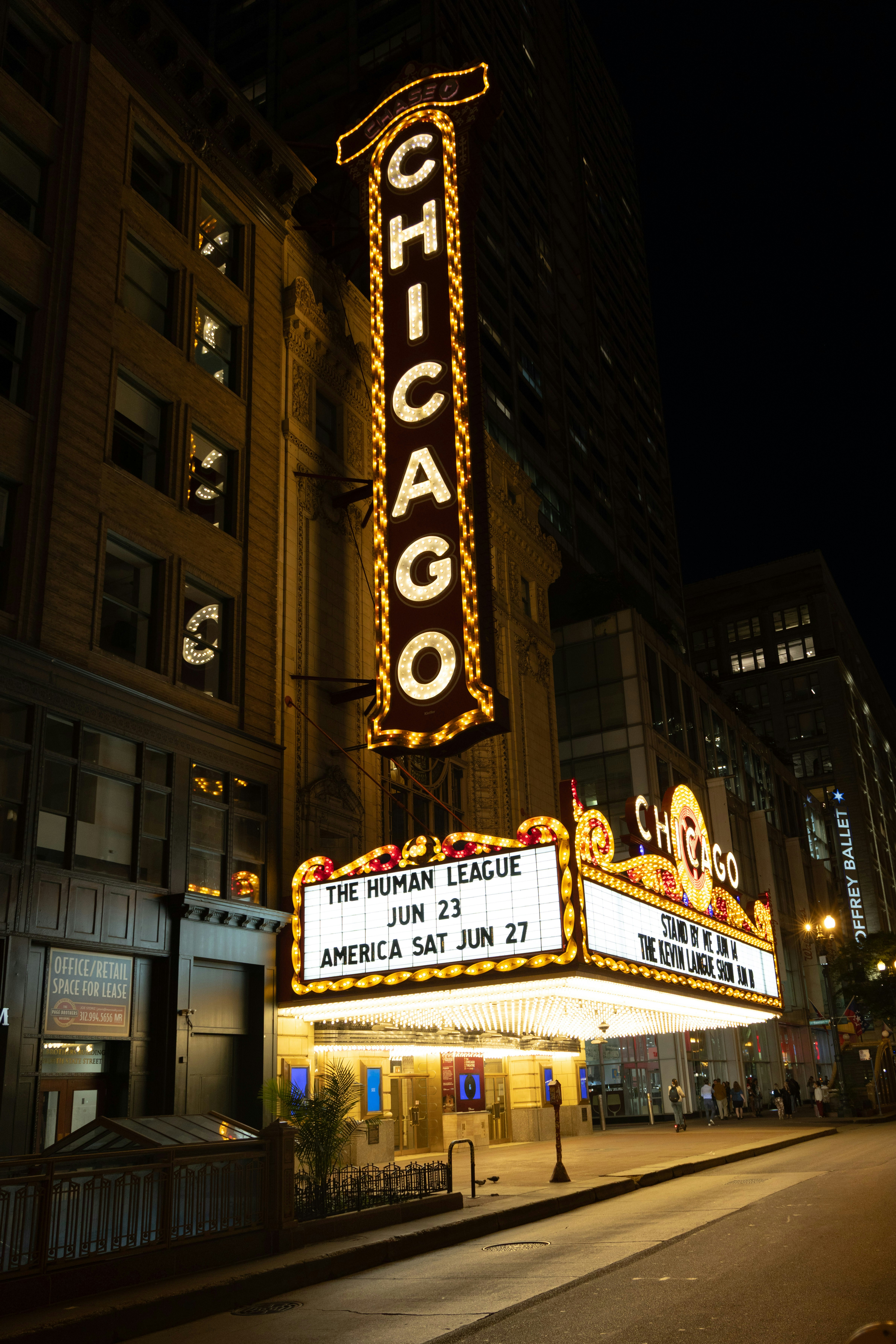 Neon Symphony on Dearborn: Chicago Theater at Night