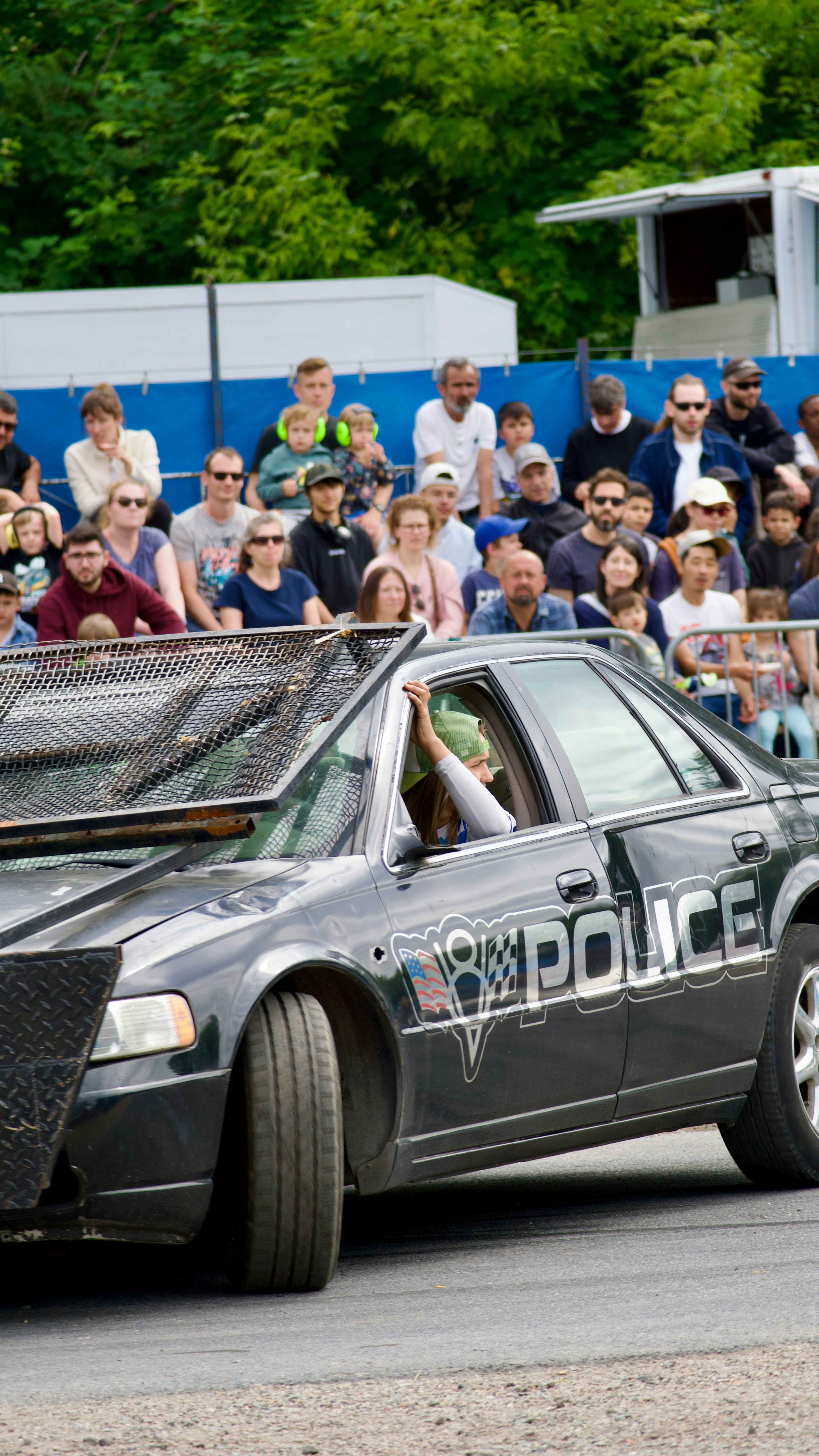 Front-Row Spectacle: A Police Cruiser at the Ready