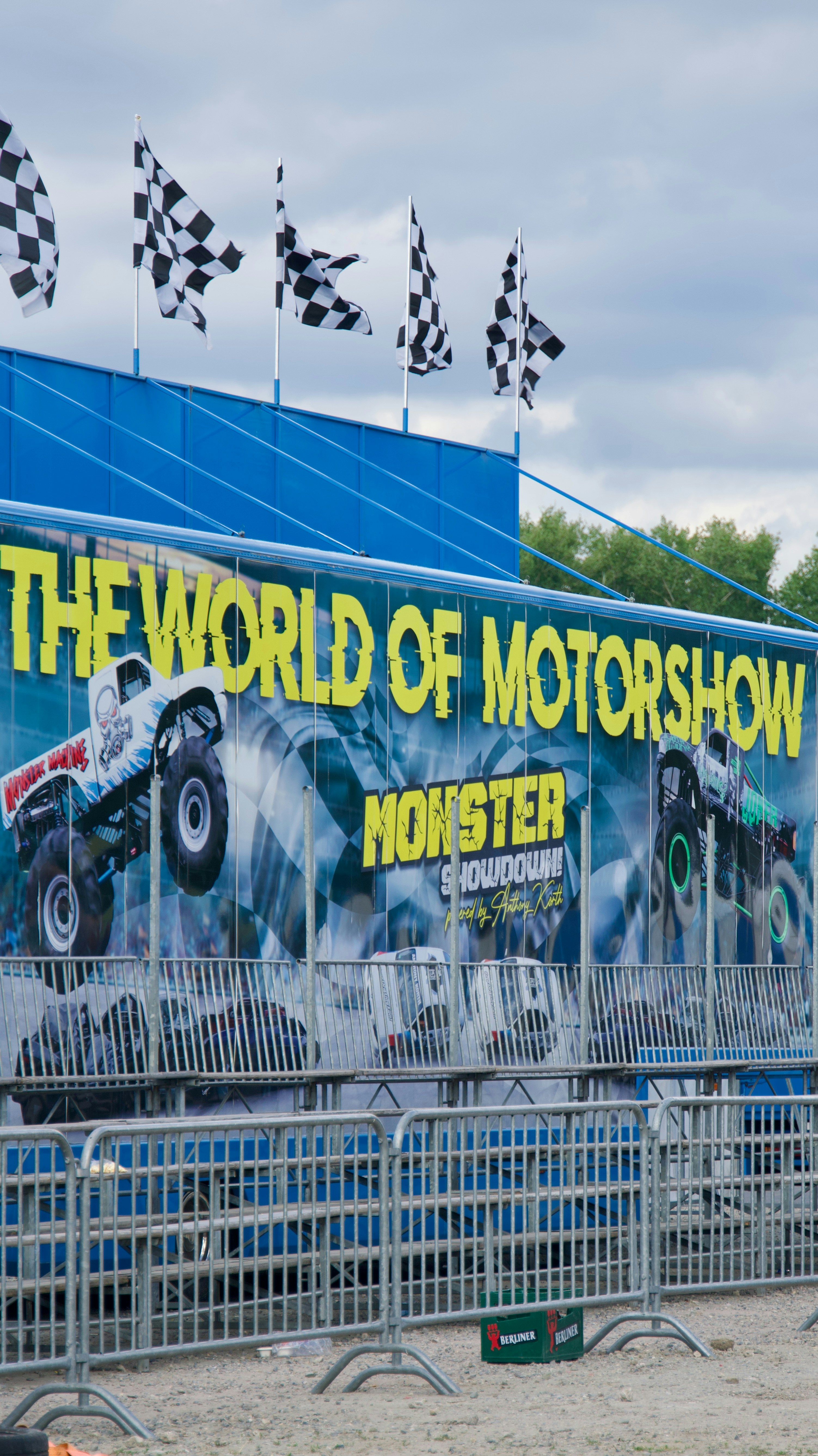 The World of Motorshow: Blue Canopy Over a Banner of Speed