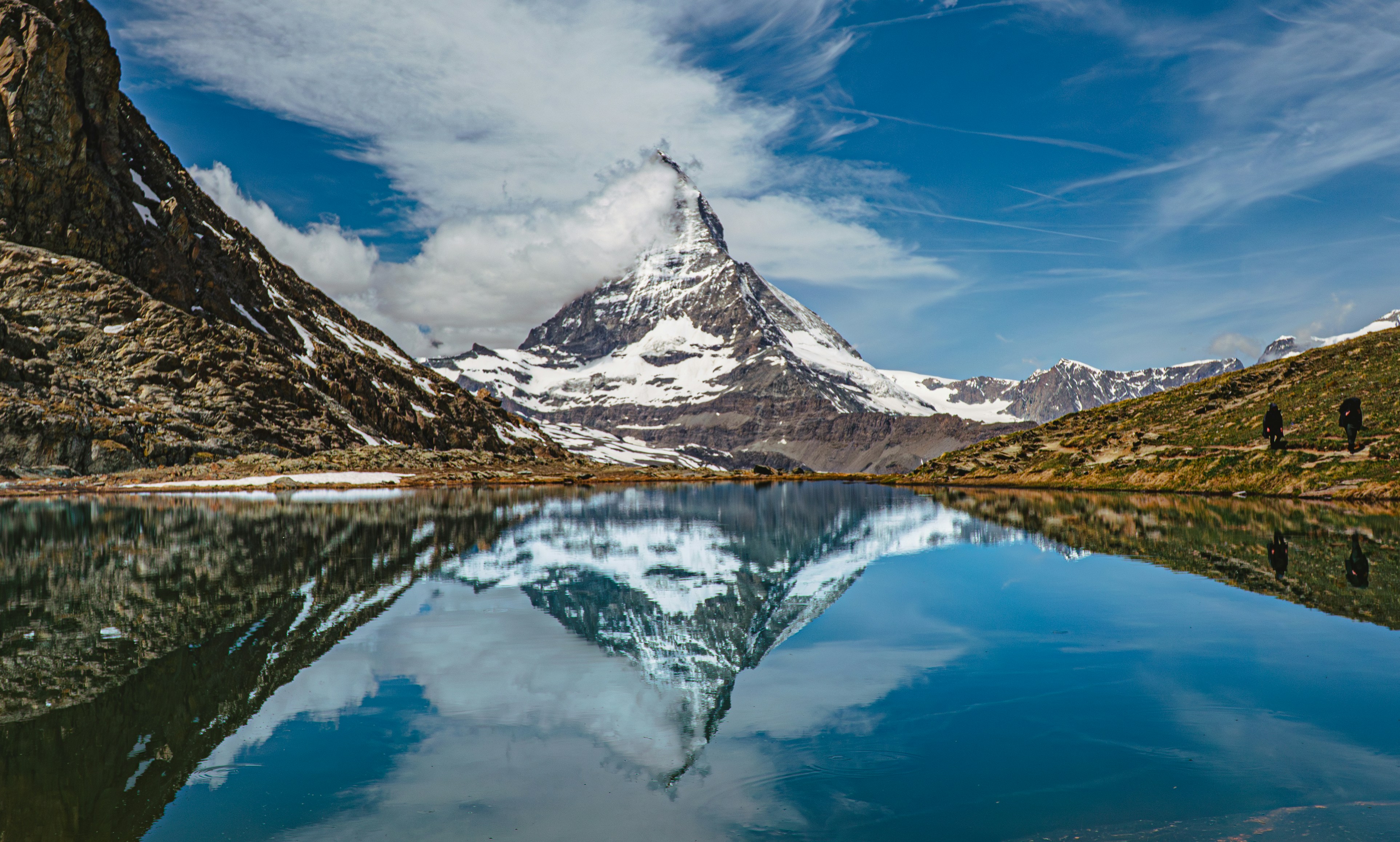 Emerald Peak Reflected: A Snow-Capped Summit Anchoring a Mirror Lake
