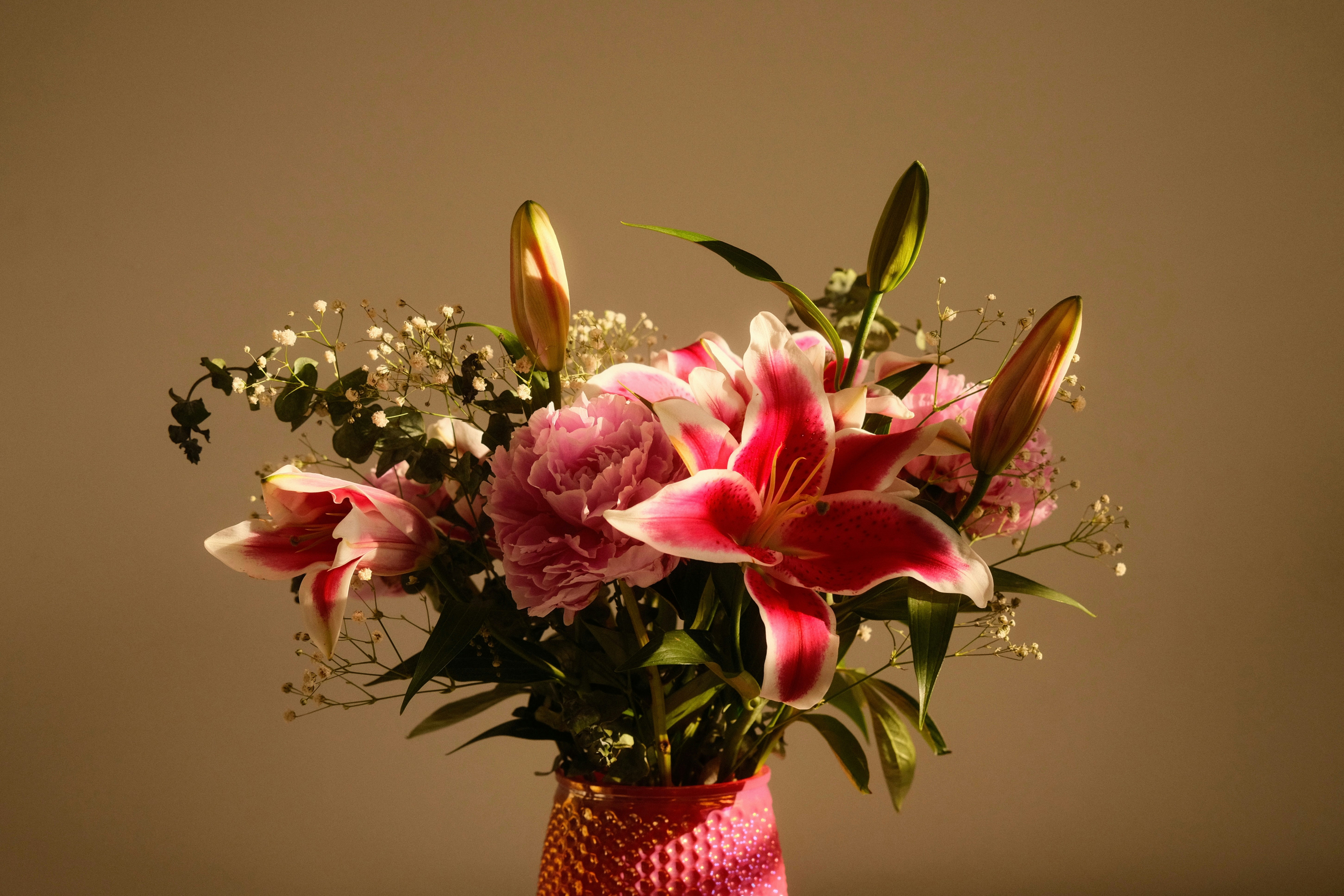 Blooming Symphony in a Coral Vase