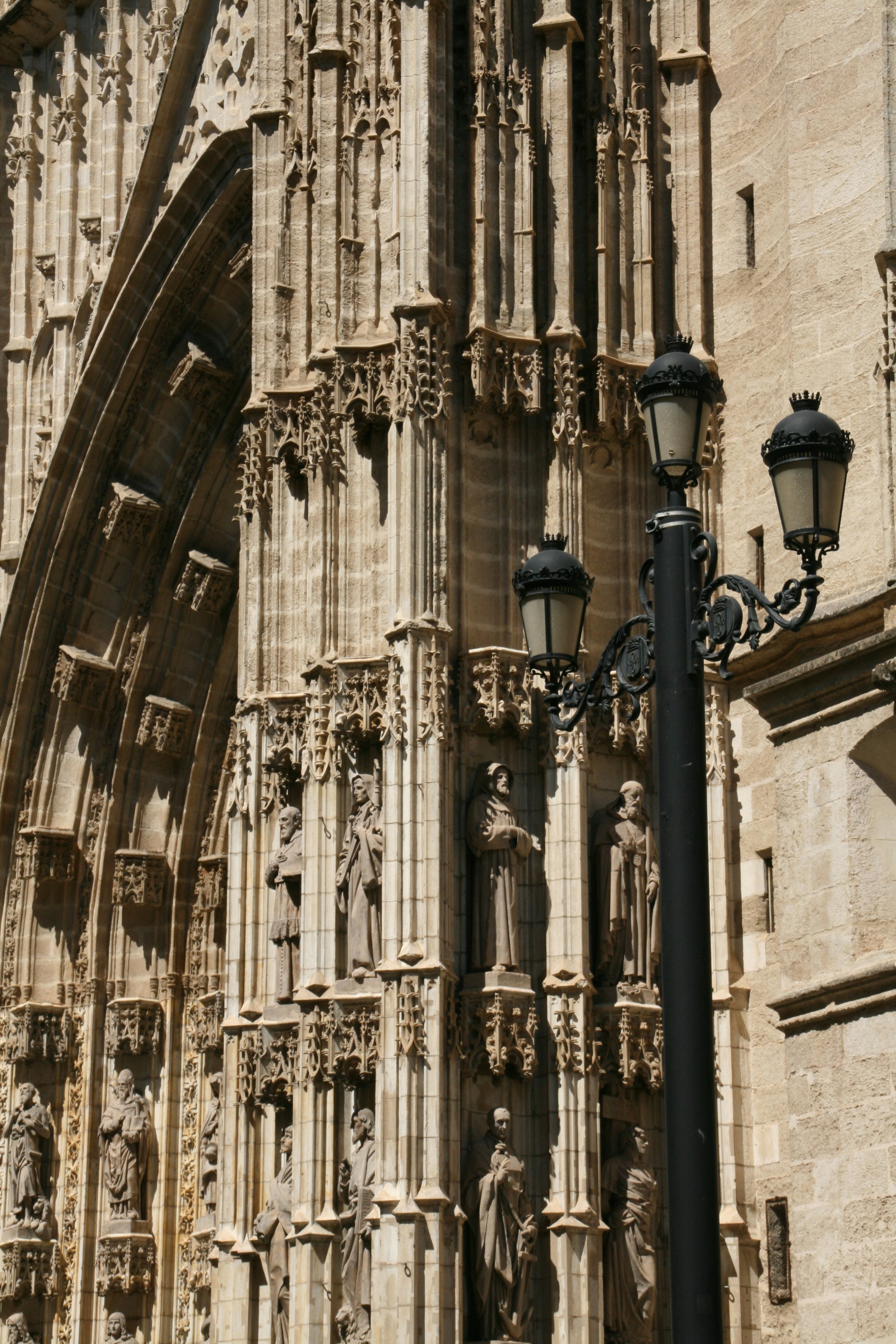 Stone Cathedral Details Beneath A Street Lamp