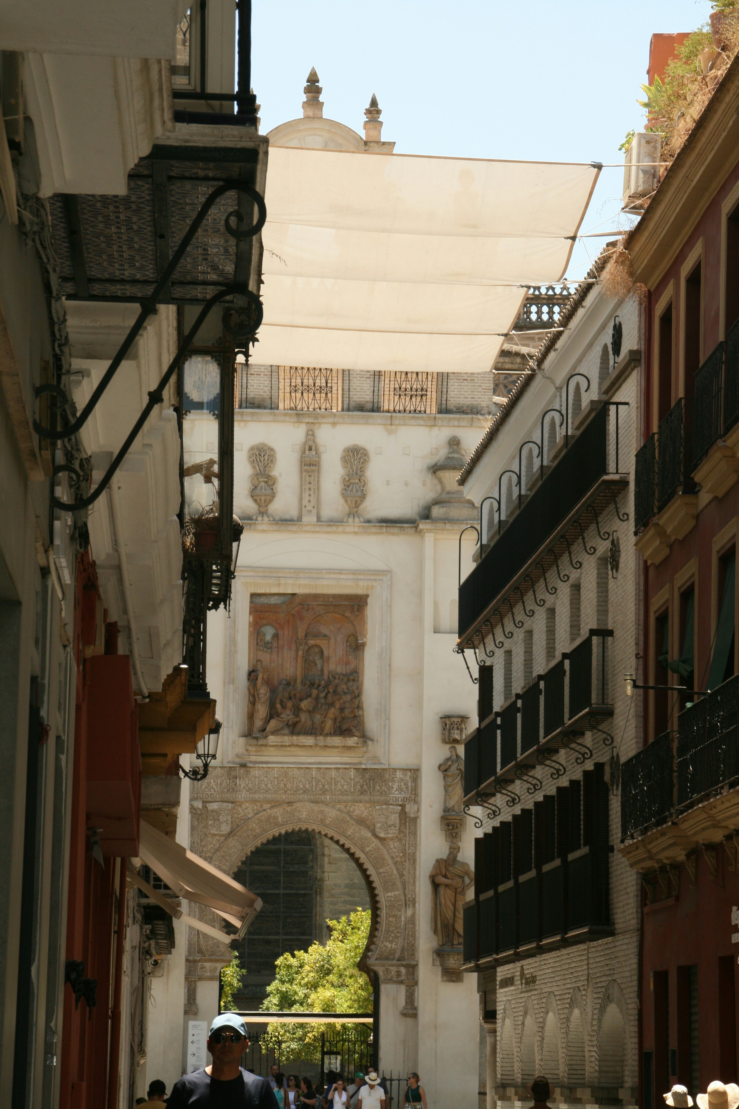 Archway of the Plaza: Street Staircase to a Sunlit Portal
