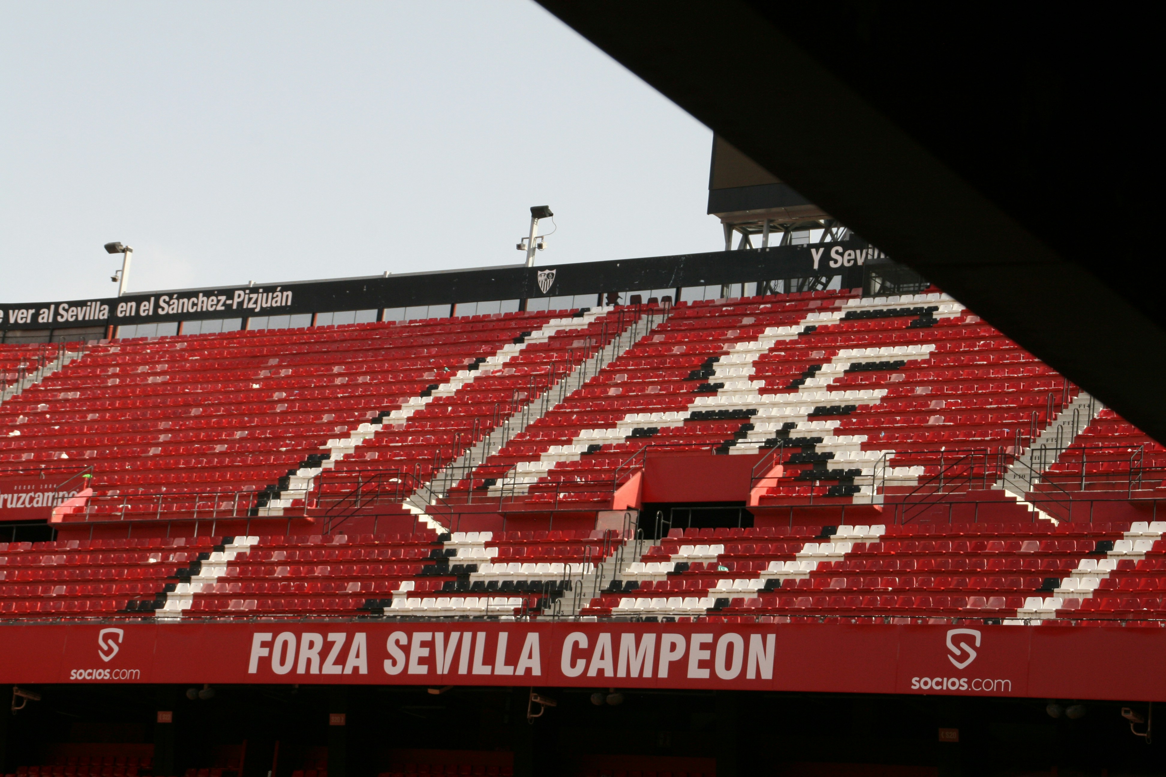 FORZA SEVILLA: Red Tiered Seats Form a Bold Mosaic