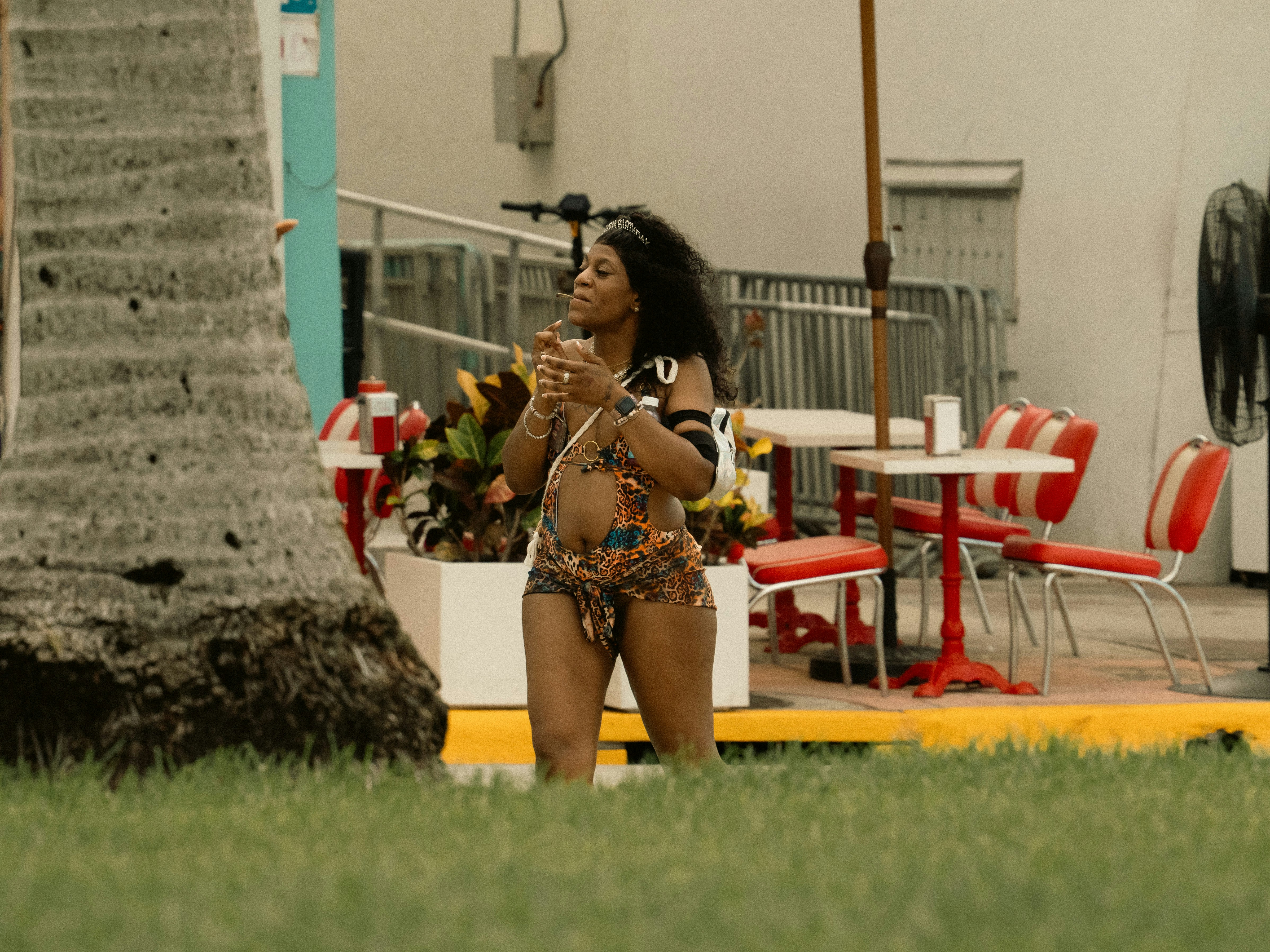 Sunlit Moment by the Poolside: A Confident Pose in Swimsuit