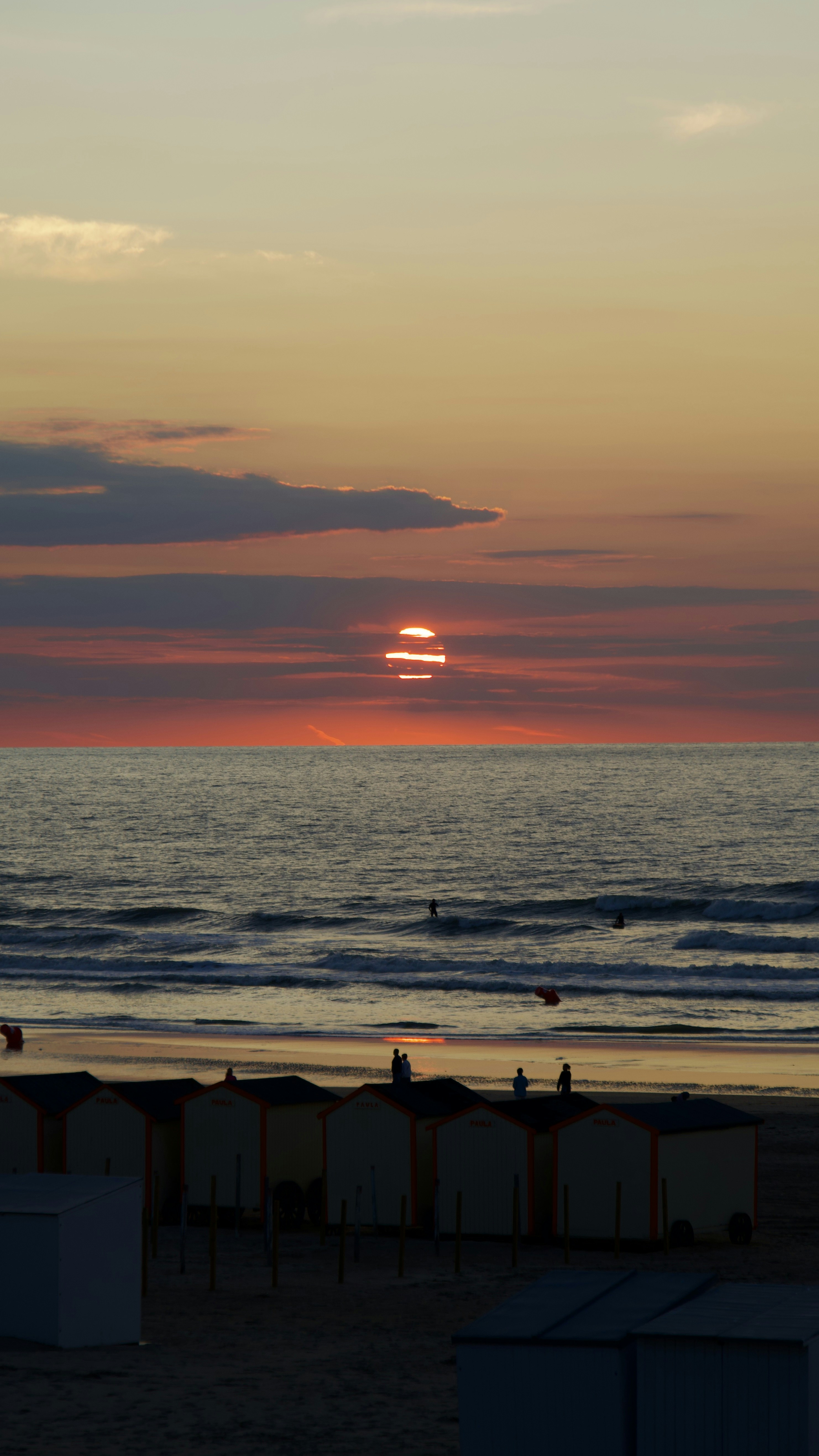 Sunset on the Sea: Silhouettes and Stripes of Light