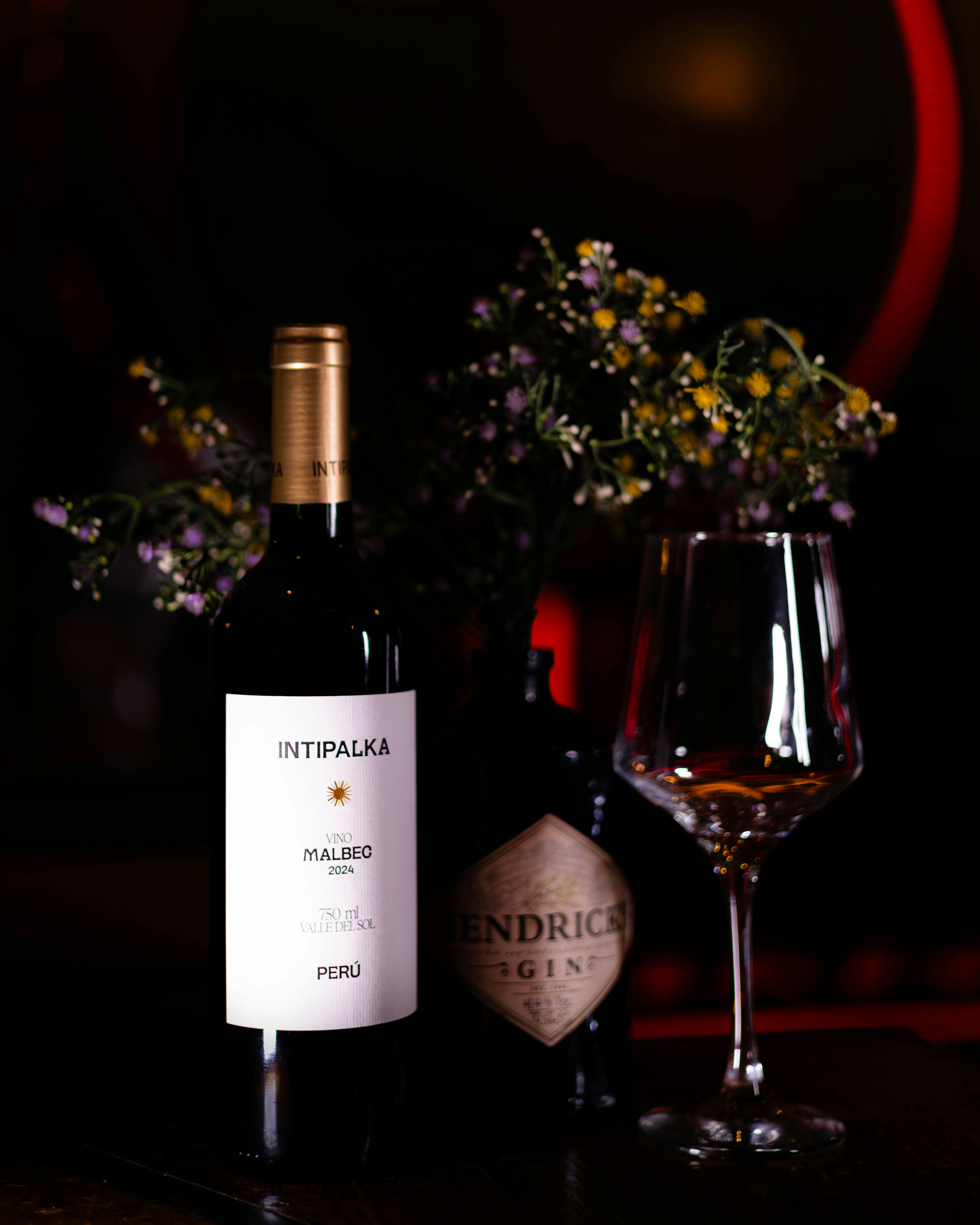 Intimate Wine Still: A Bottle of Malbec with Ambient Glass