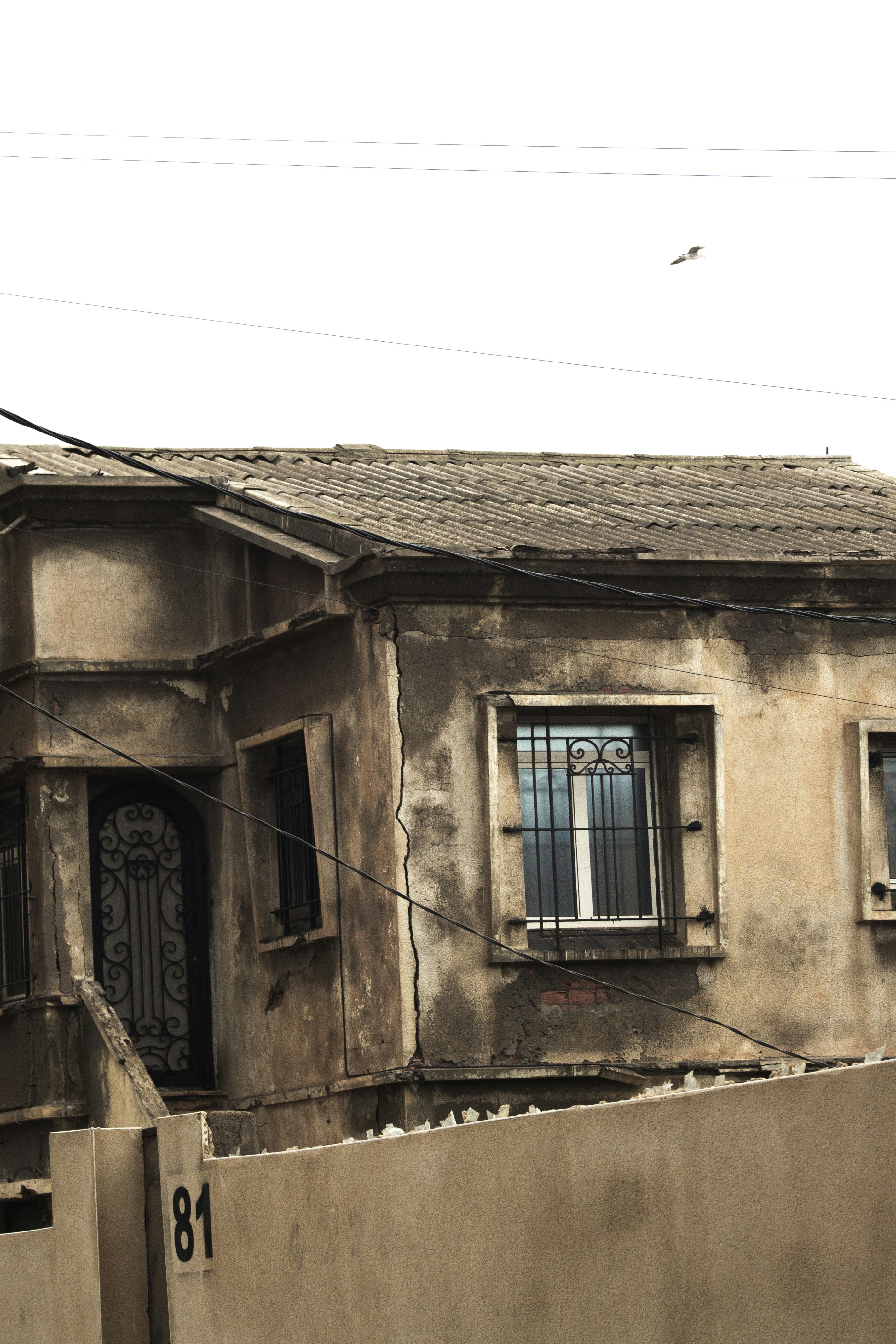 Weathered Terrace: A Quiet Facade Gathers Its Story