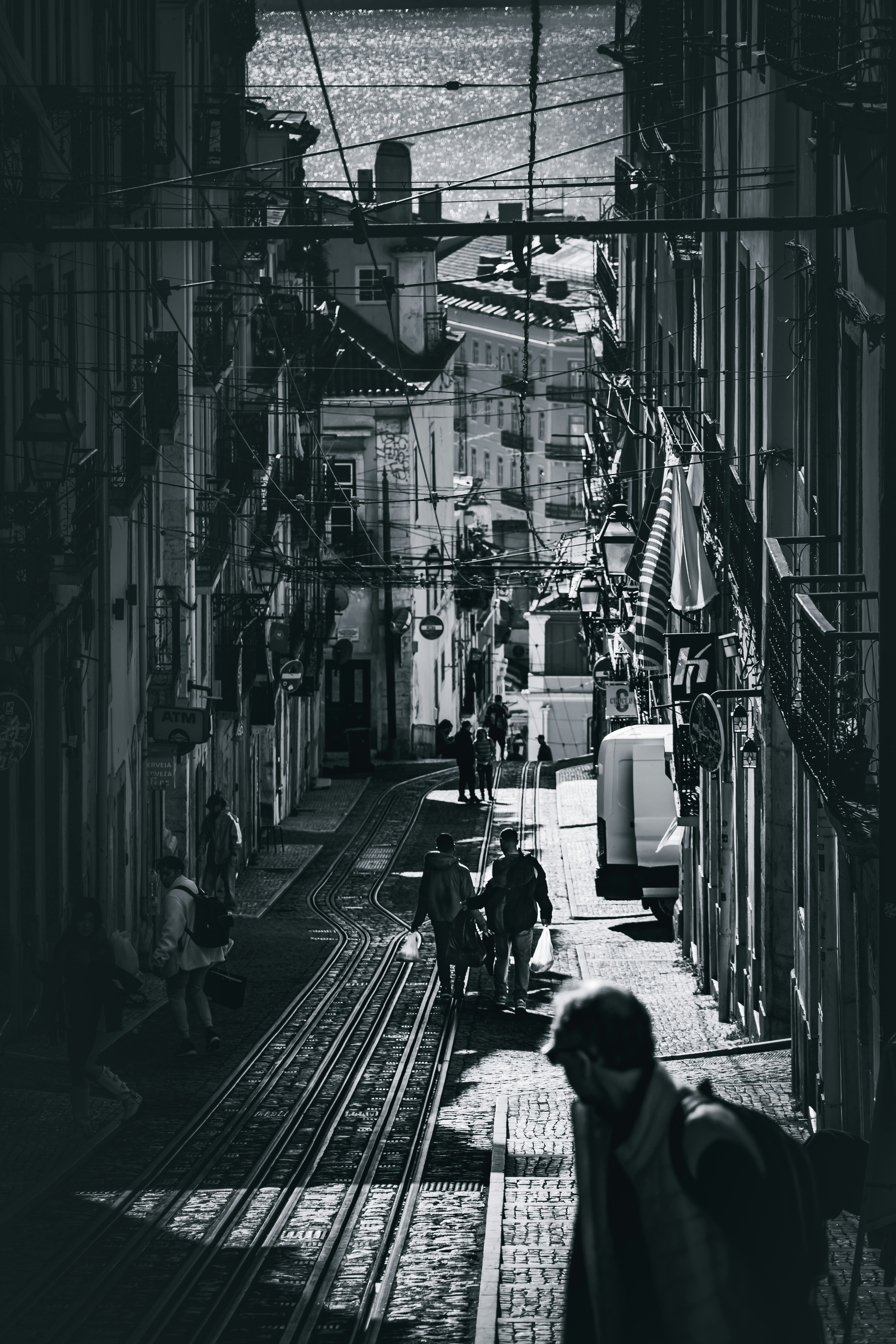 Mid-Urban Echoes: A Sunlit Trench Through Narrow Streets
