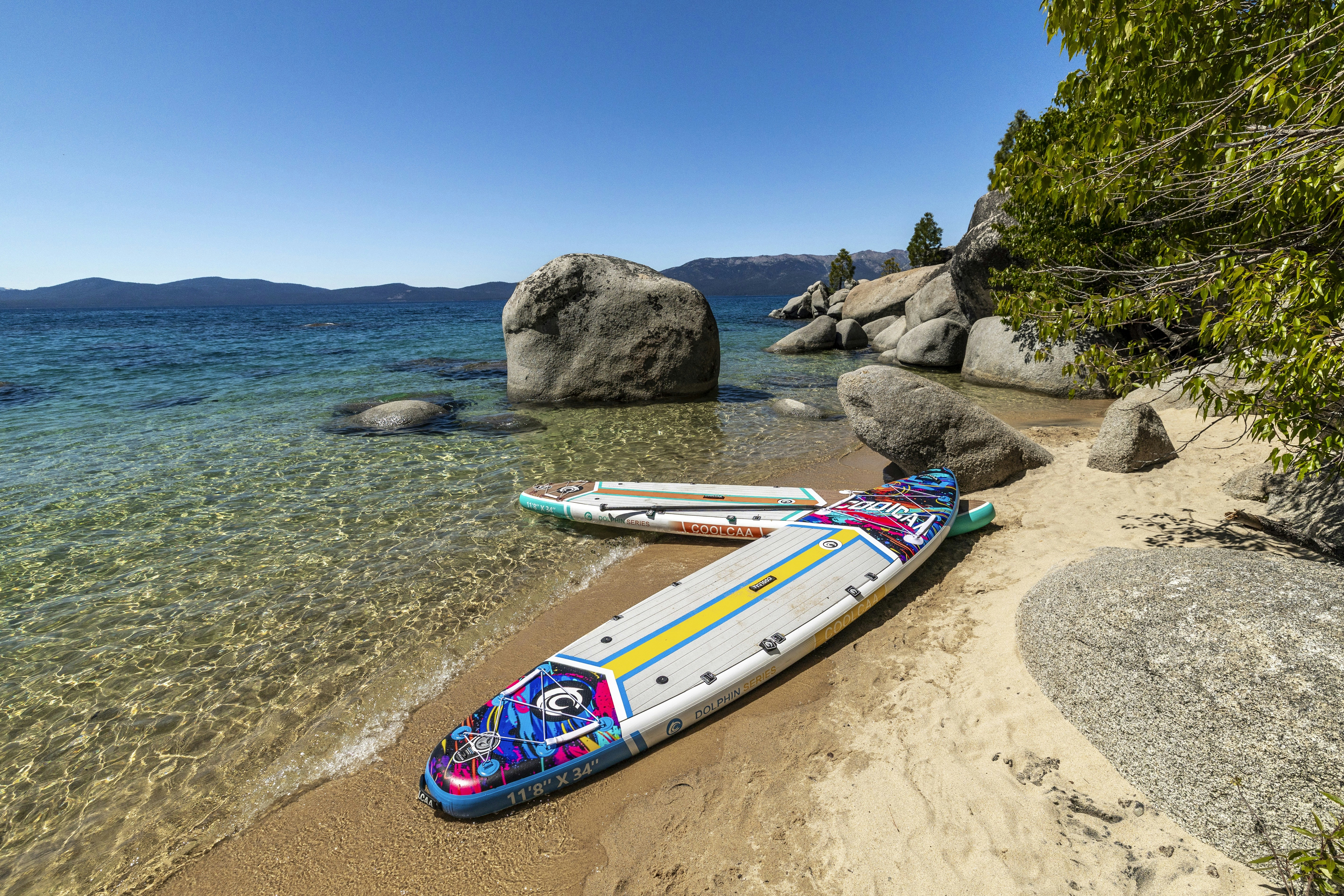 Surfboards Rest on Amber Sands Beneath a Quiet Azure Sea