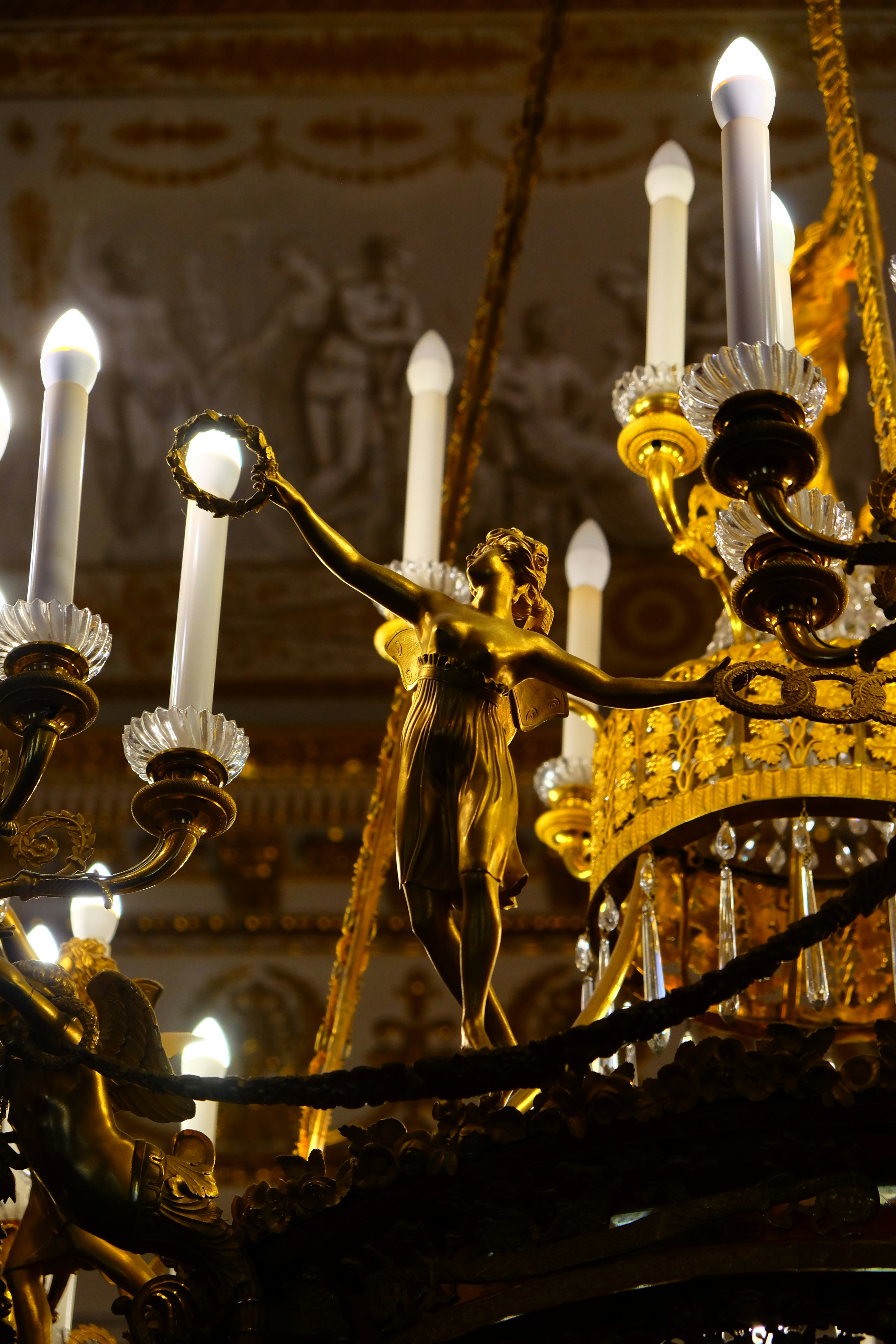 Golden Cherub in a Crowned Chandelier