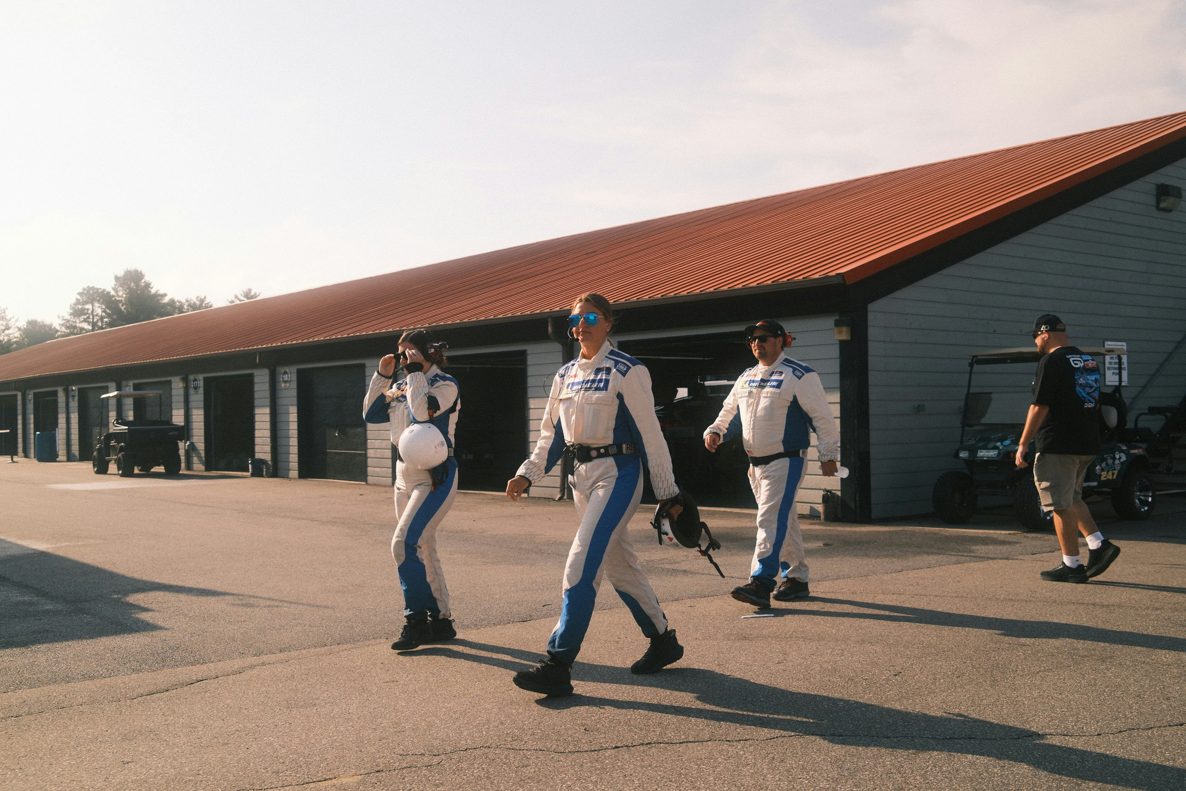 Racing Team Exit: Four Pilots Striding from the Pits