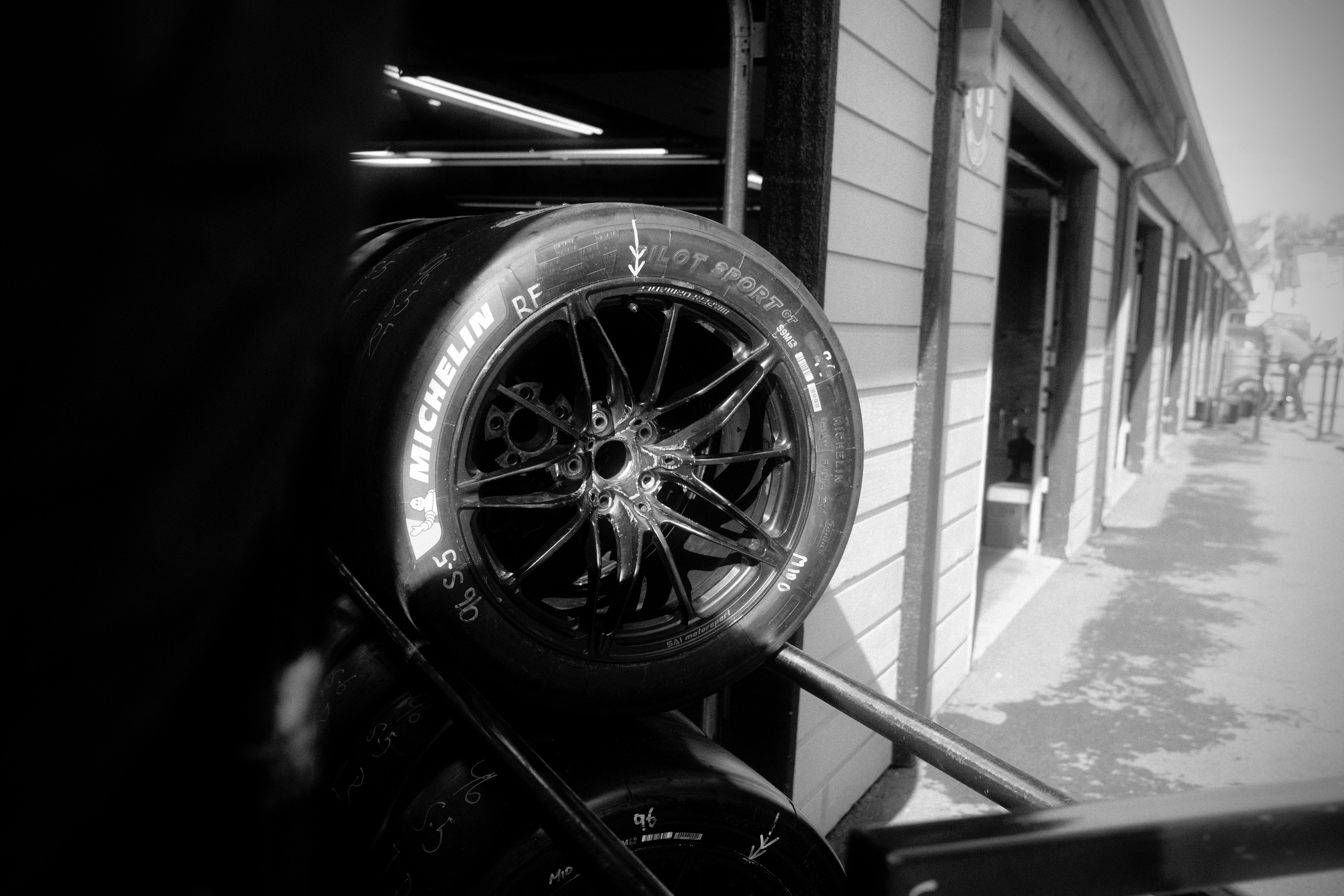 Tire Rack in a Quiet Garage: A Tire Shop's Moment Captured