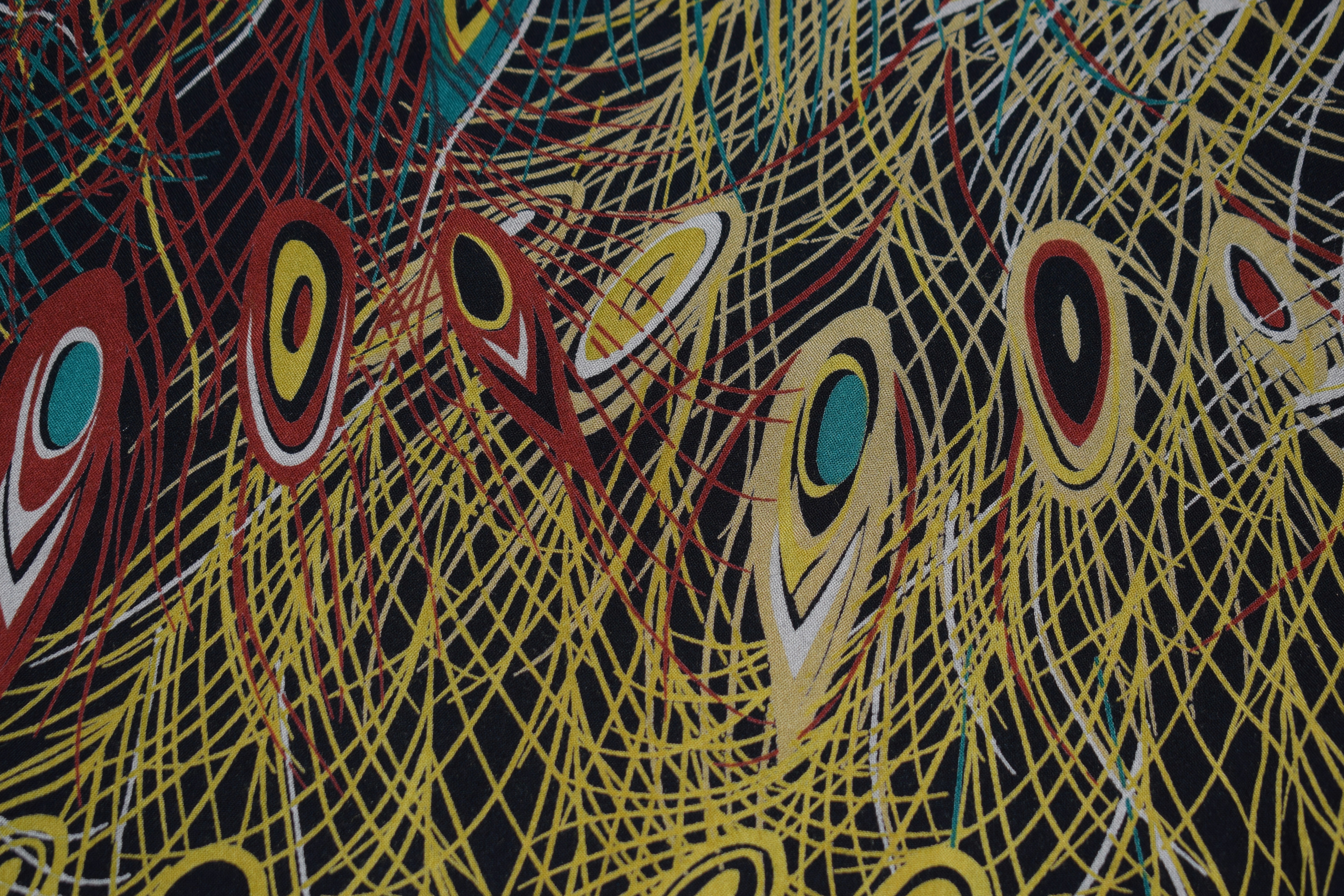 Chaotic Rings: a burst of color spirals across a dark canvas