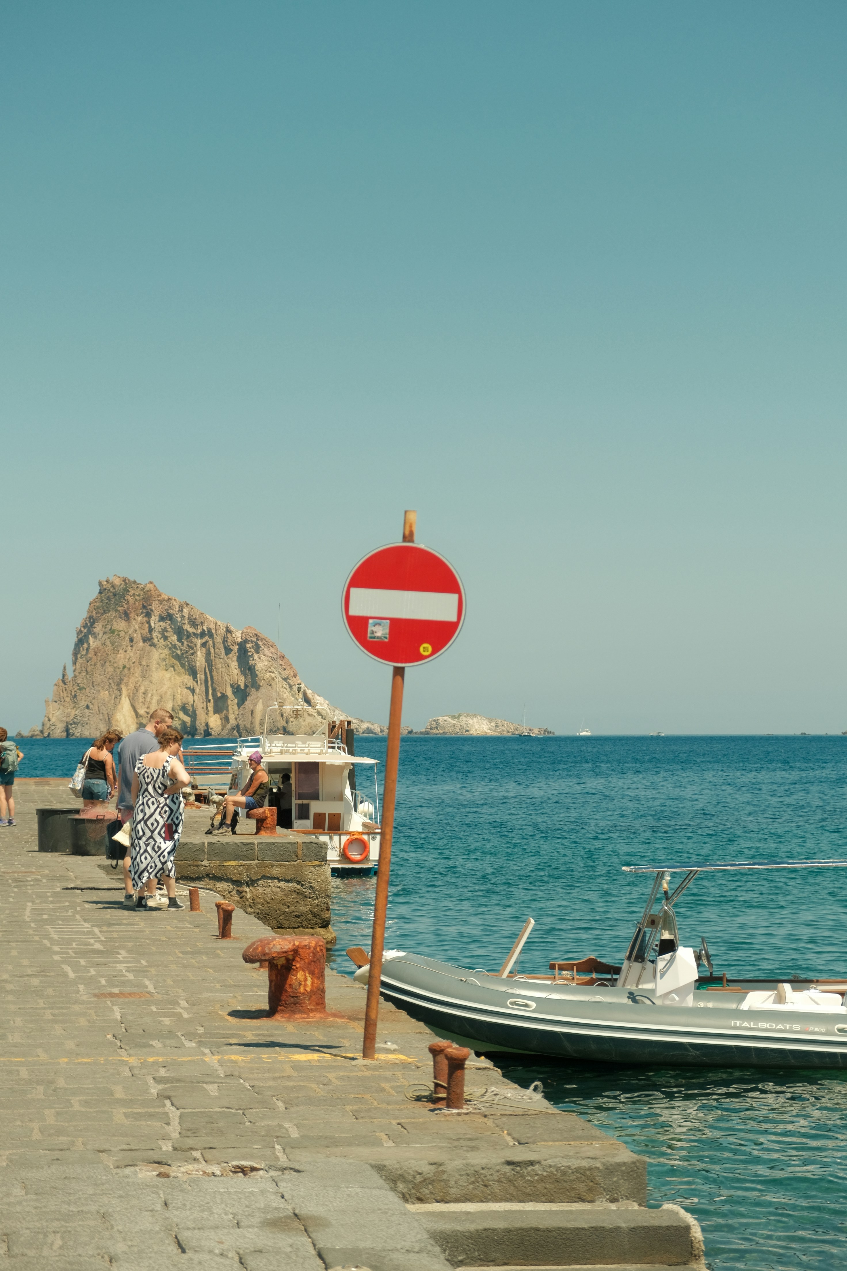 Harbor Gatekeeper: Red Sign and Sea Path
