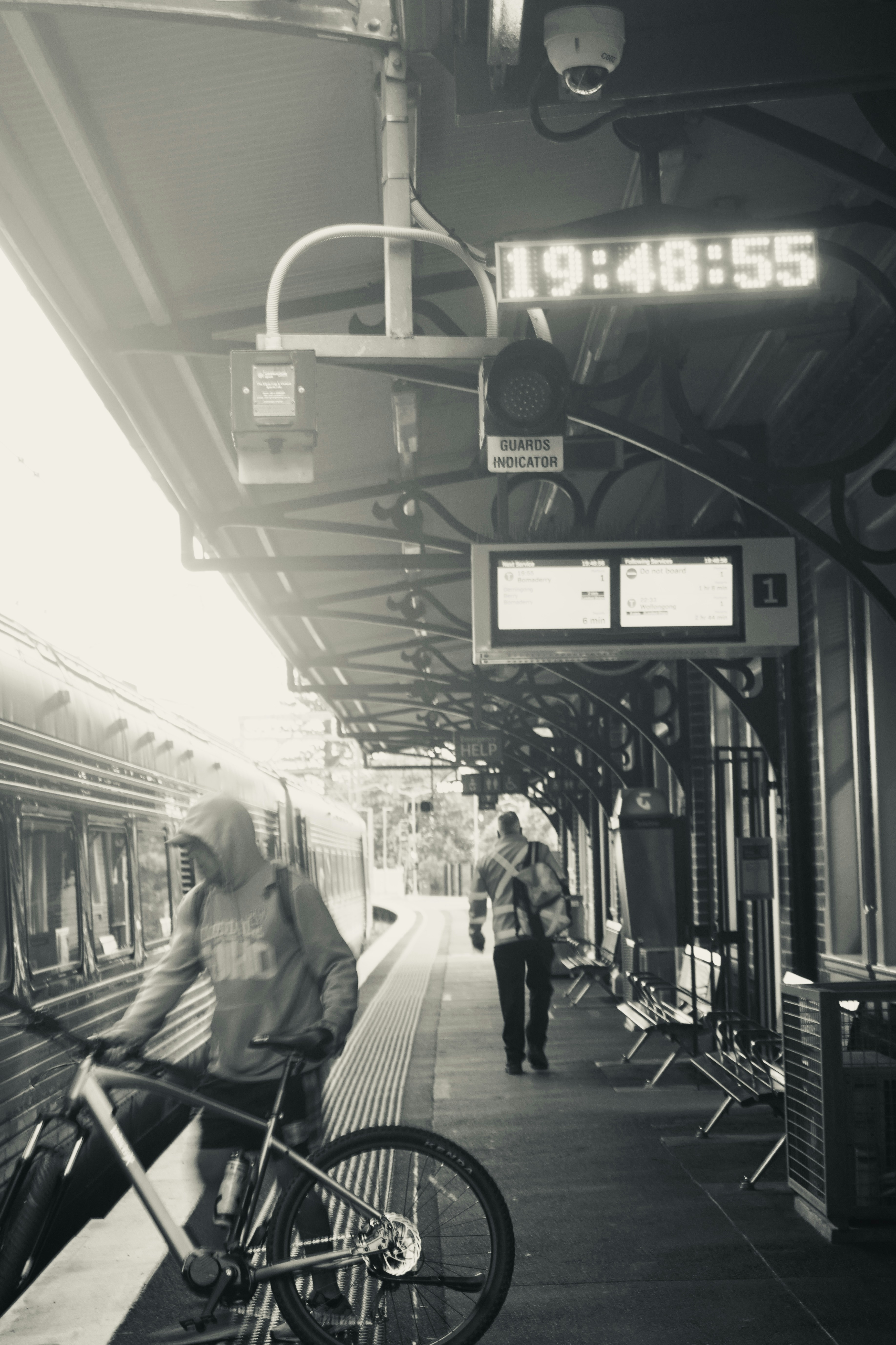 Quiet Platform, Moving Shadows: A Sudden Pause at Dusk