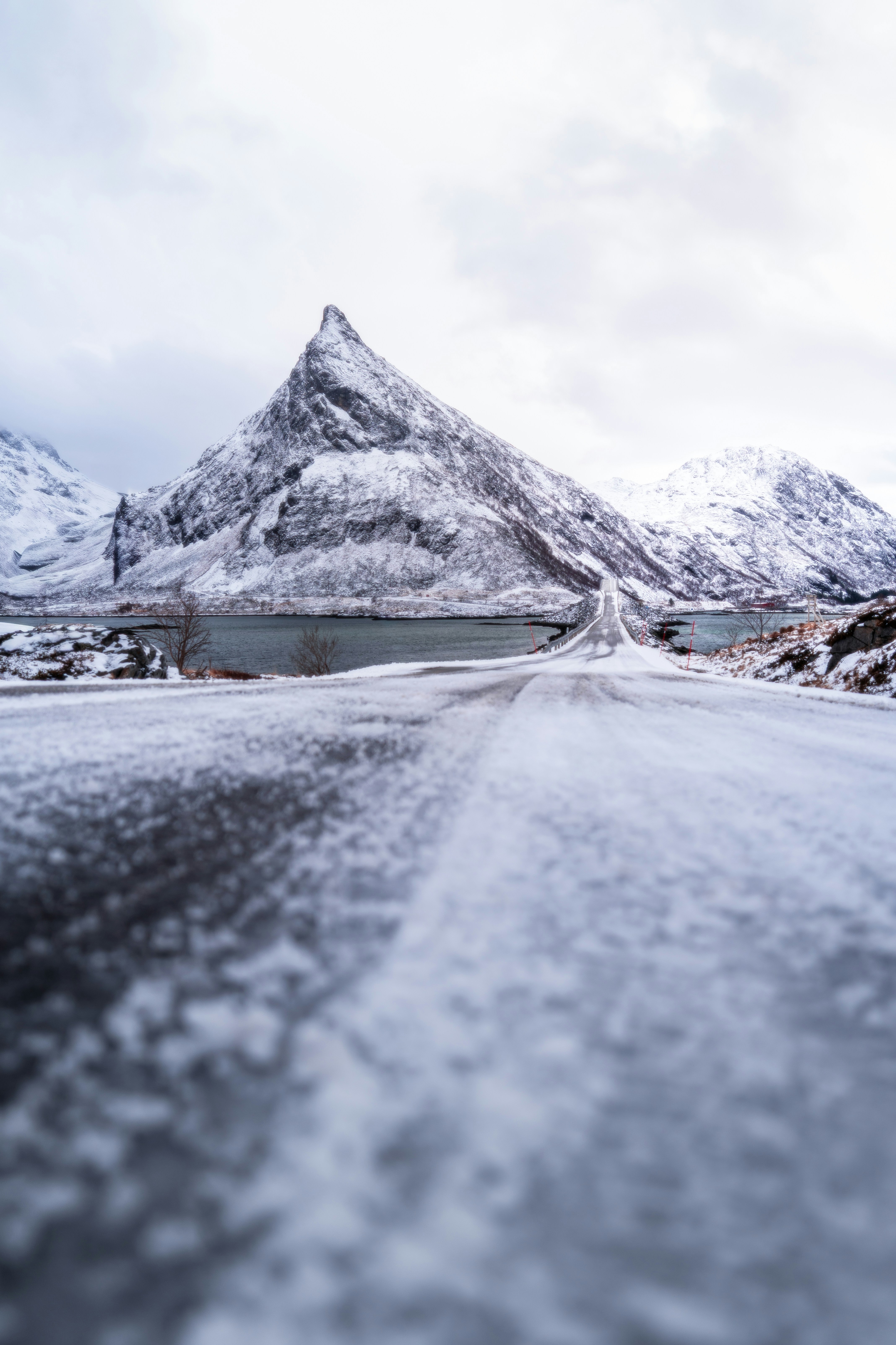 Snowy Tongue of Road Toward a Mountain Harbor