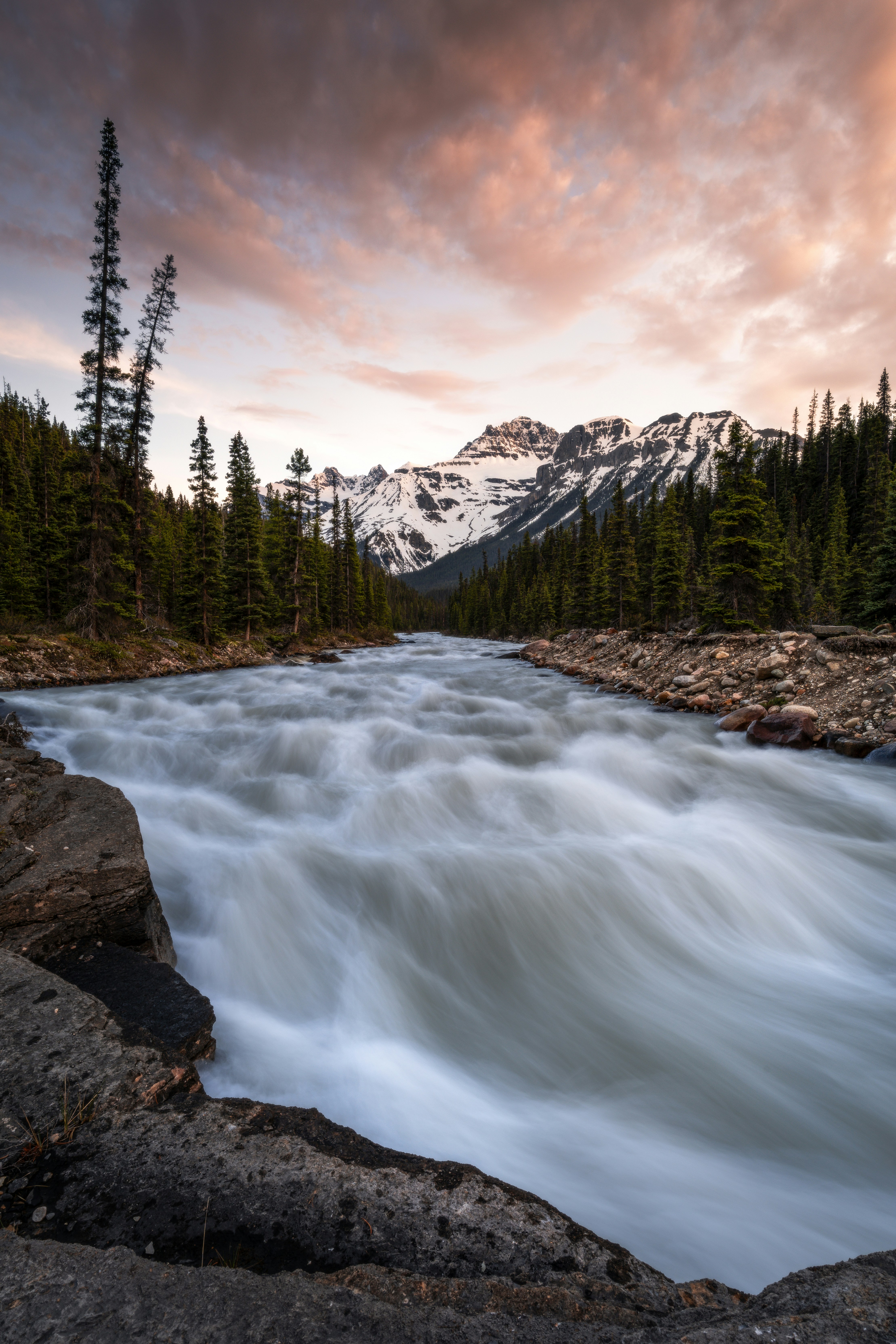 Rushing Tides Through Alpine Gorges at Dusk