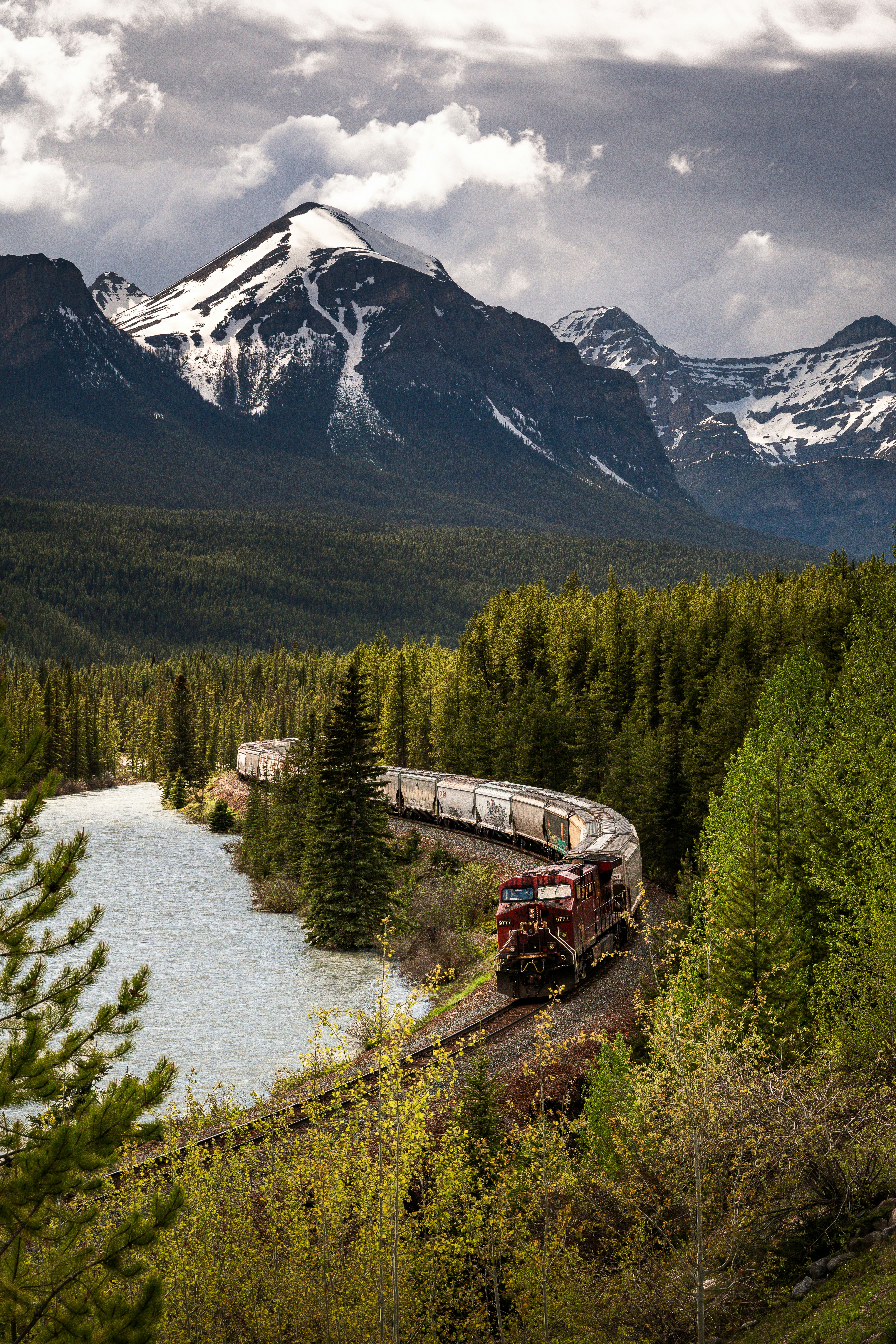 Snowcapped Peaks and a Winding Vein: A Mountain Train Journey