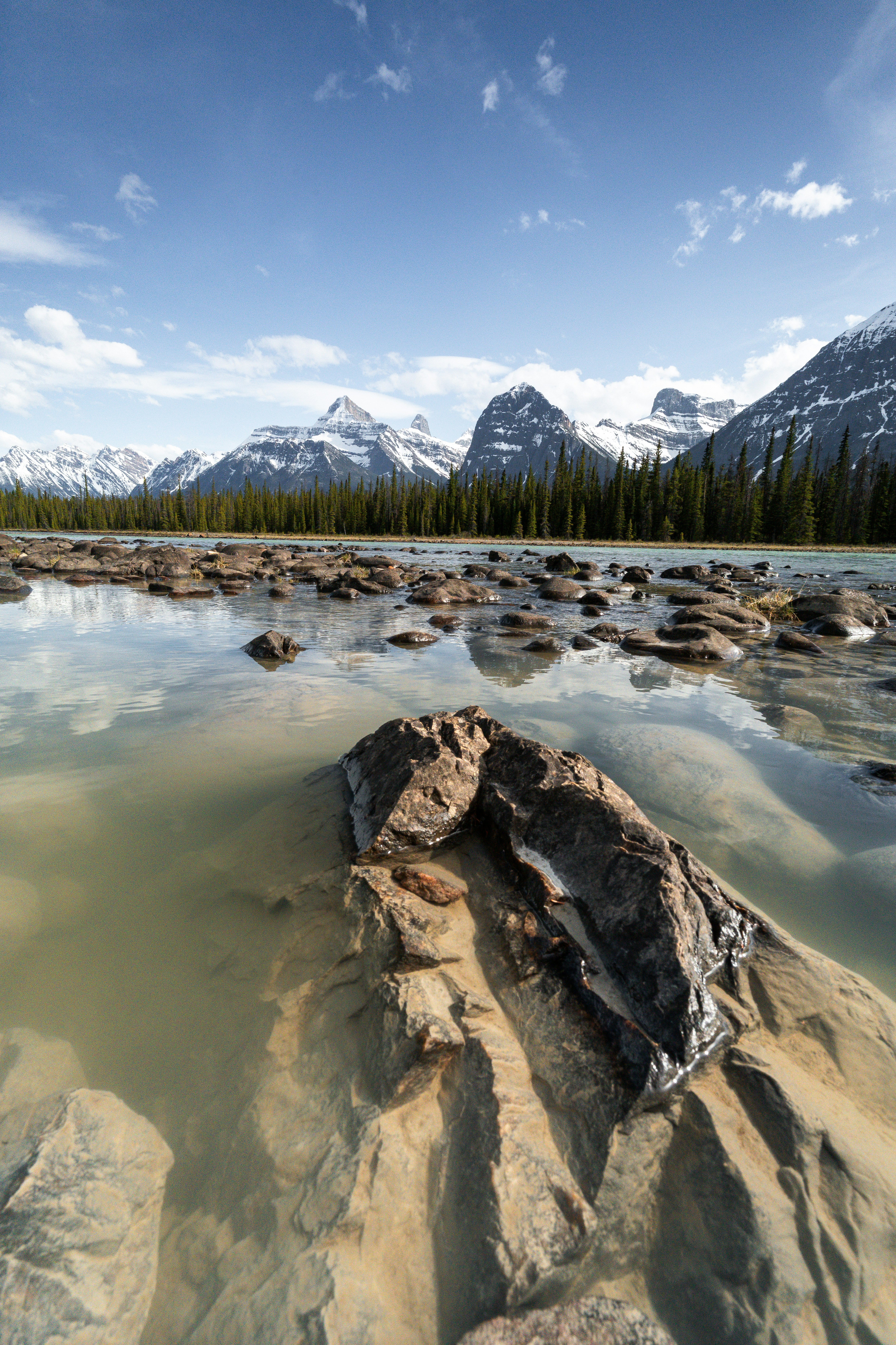 Towering Peaks Over Turquoise Depths: A Mountain Lake Landscape