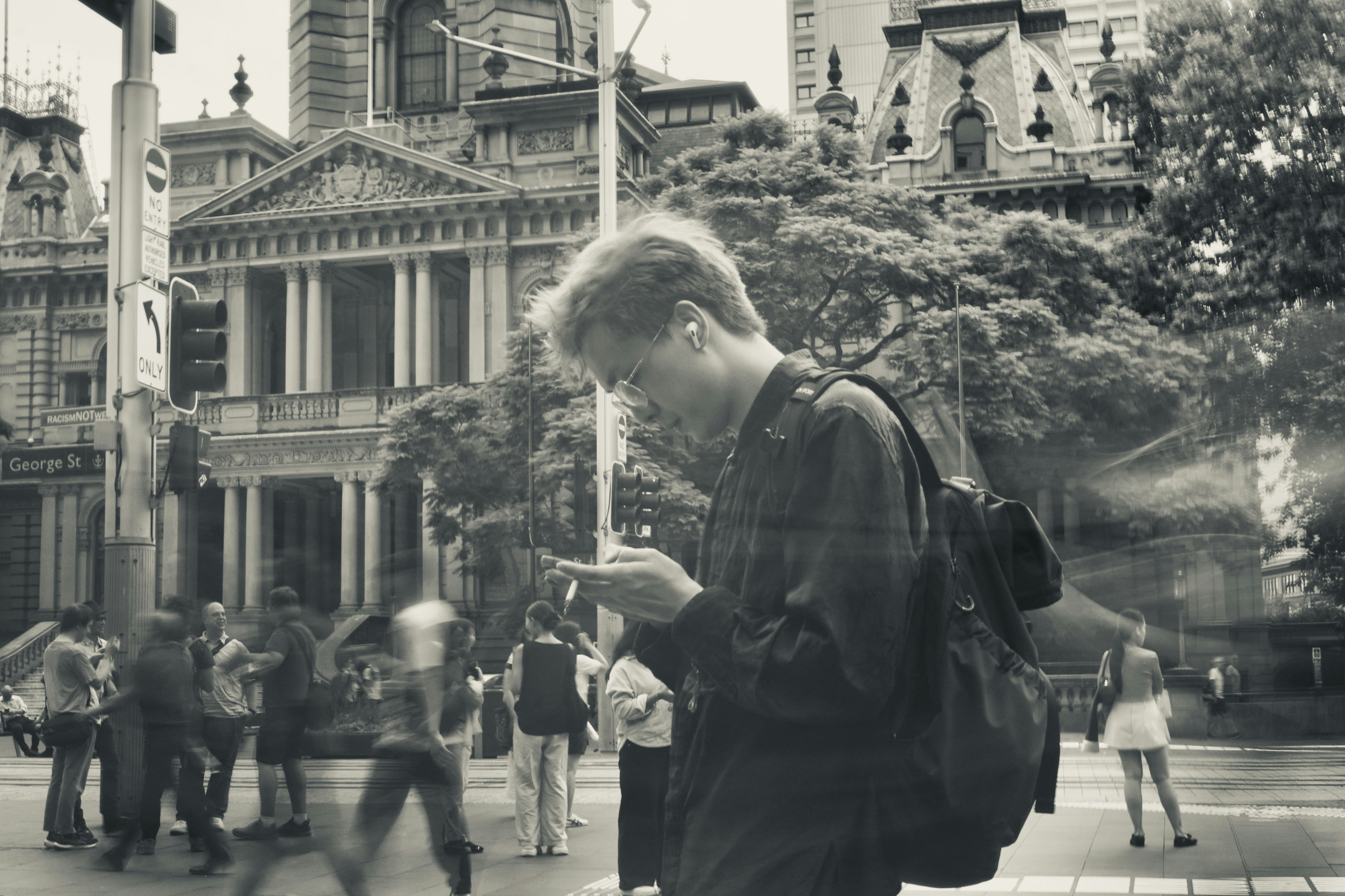 Backlit in Transit: The Quiet Focus of a Street Portrait