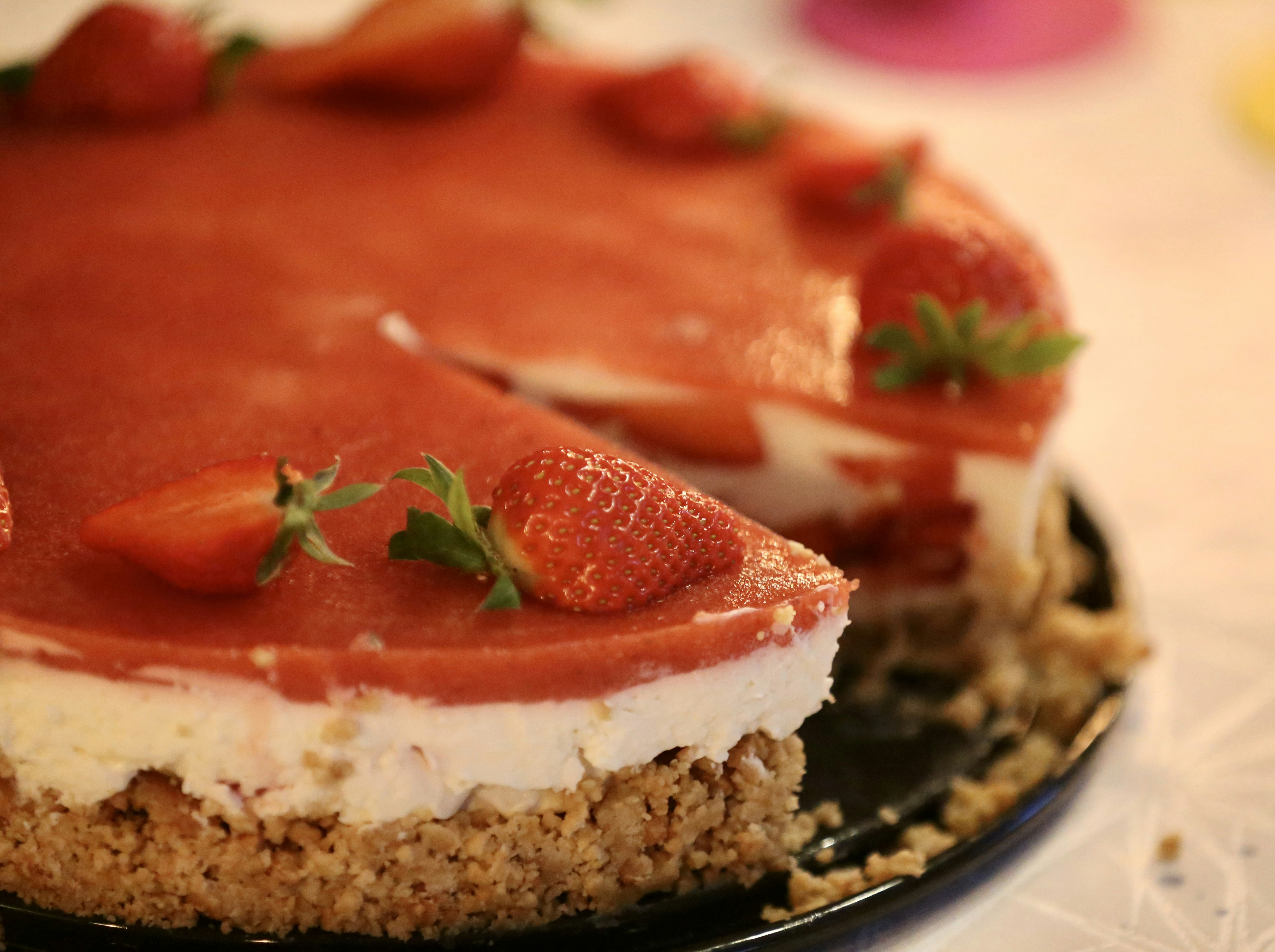 Strawberry-Glazed Cheesecake Slice with Crumb Base