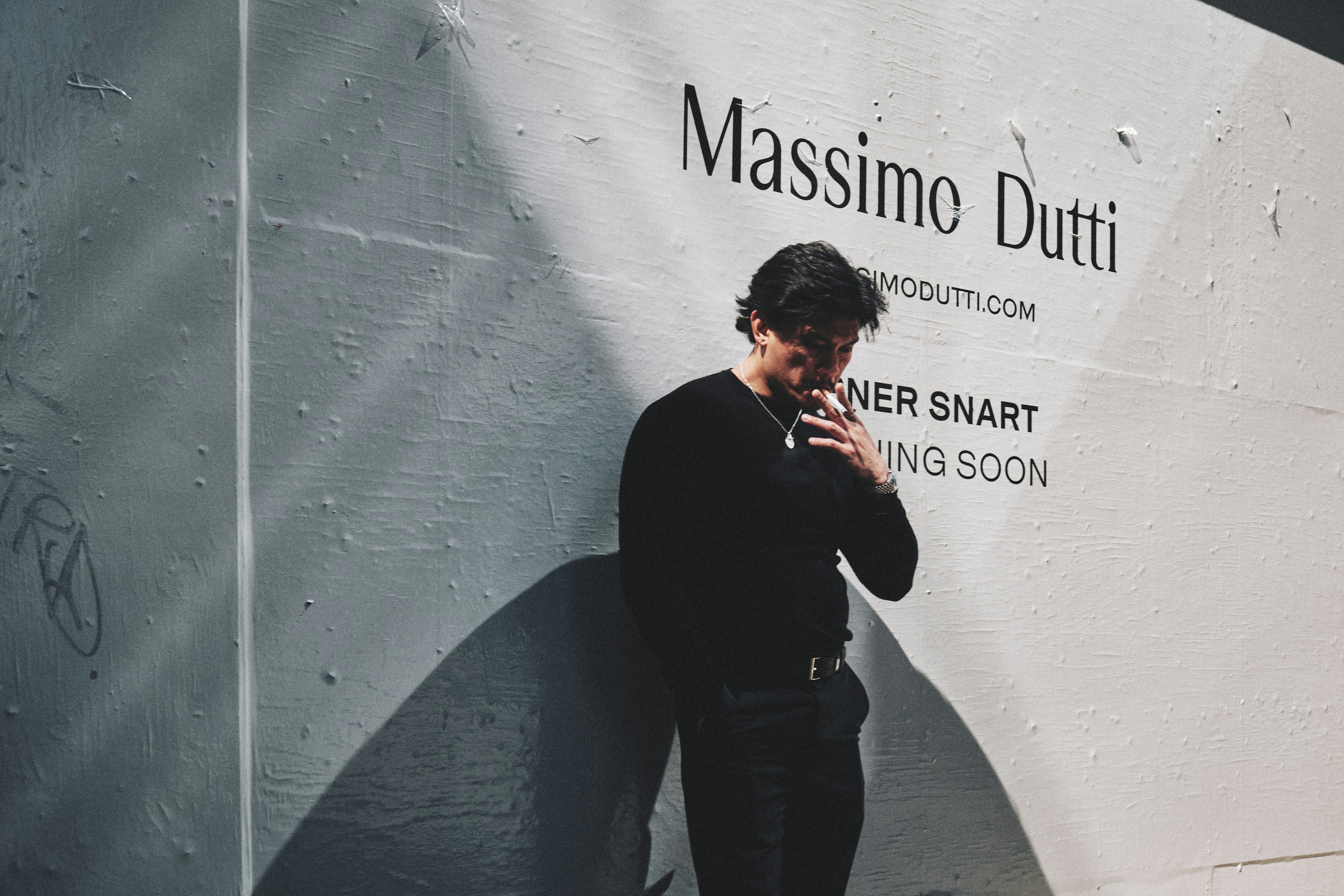 Shadowed Persona by a Massimo Dutti Wall