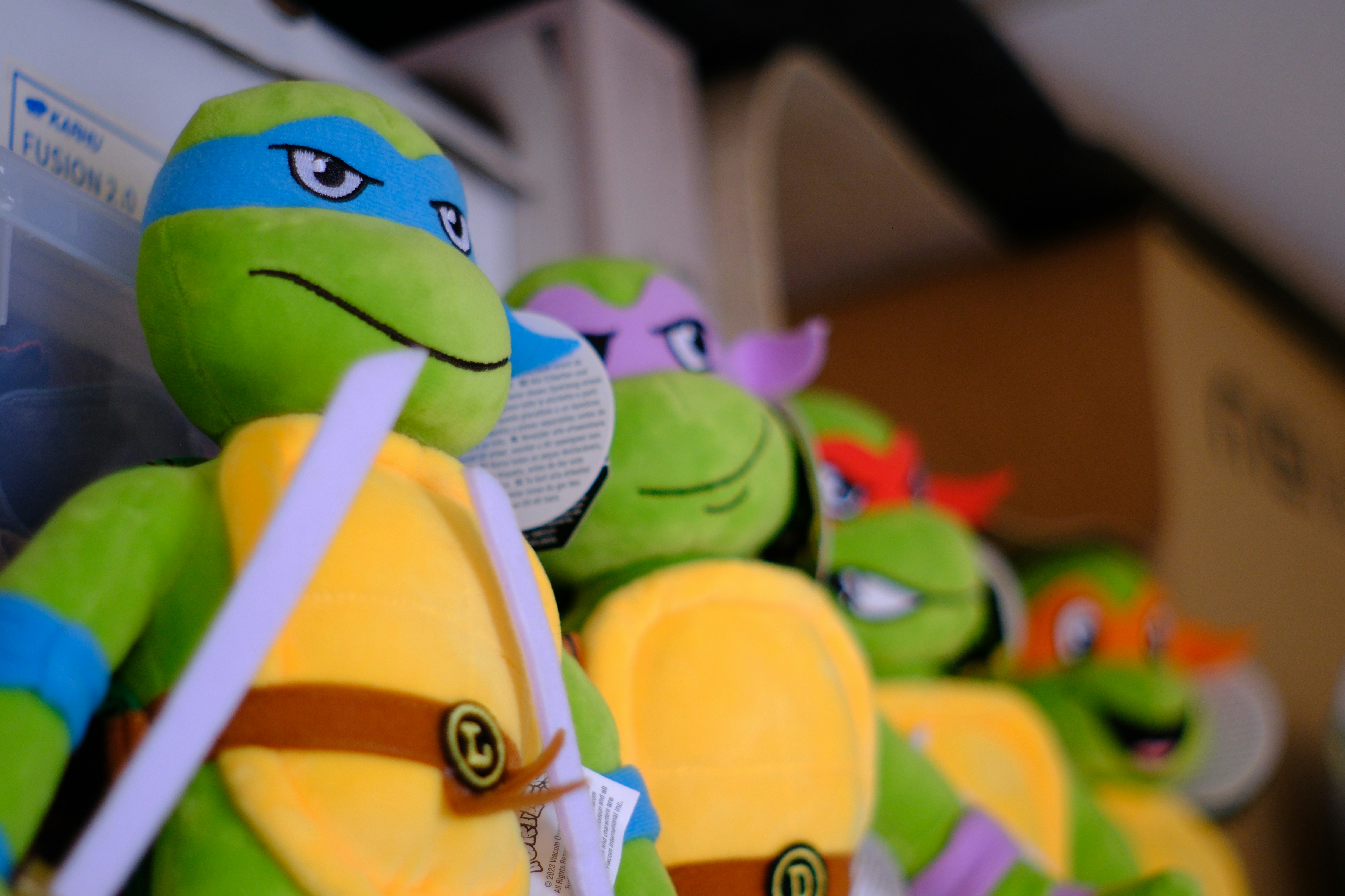 Green Ninja Plushes in a Toy Aisle