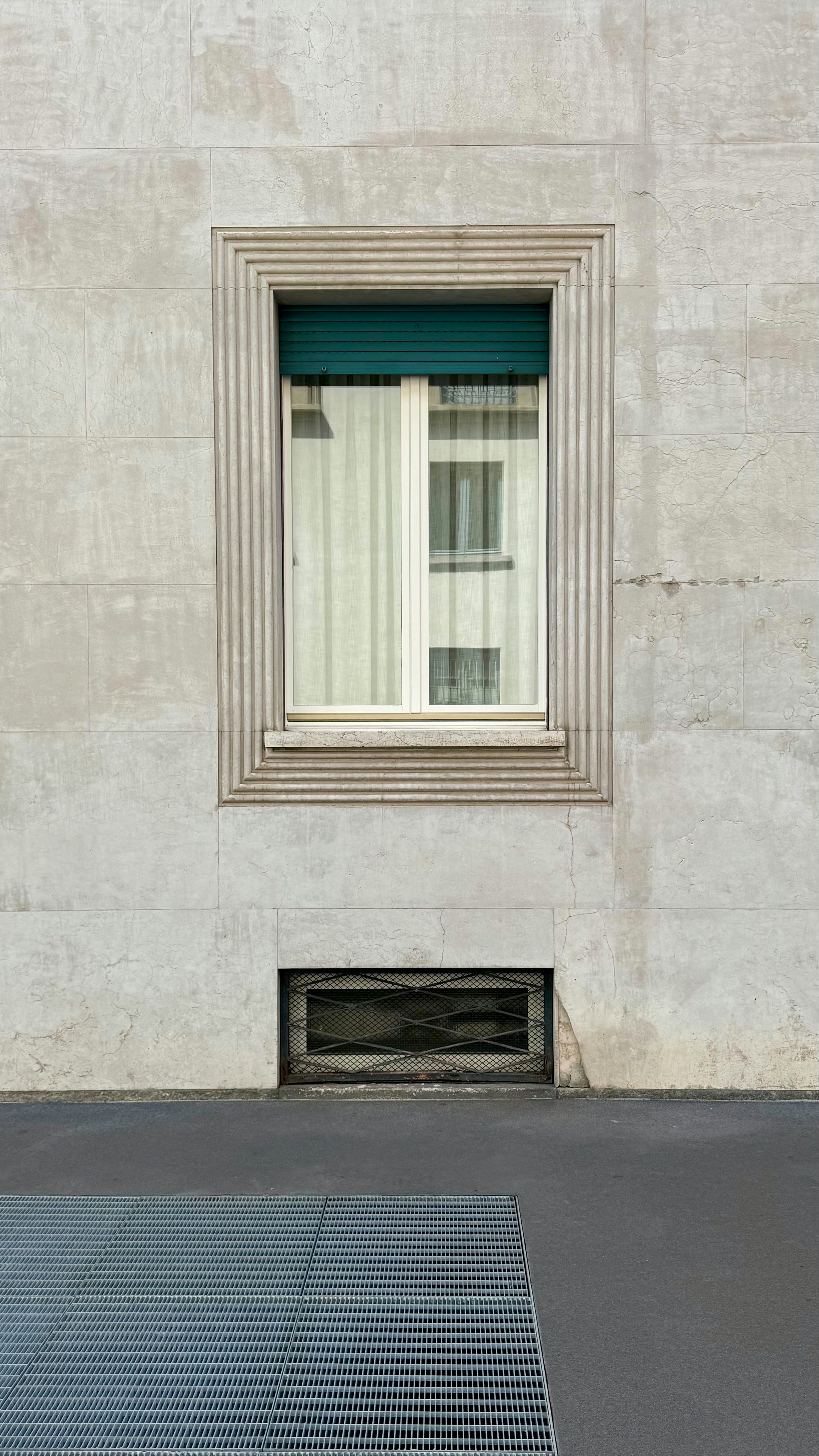 Windowed Geometry: A Framed Facade with Grounded Grille