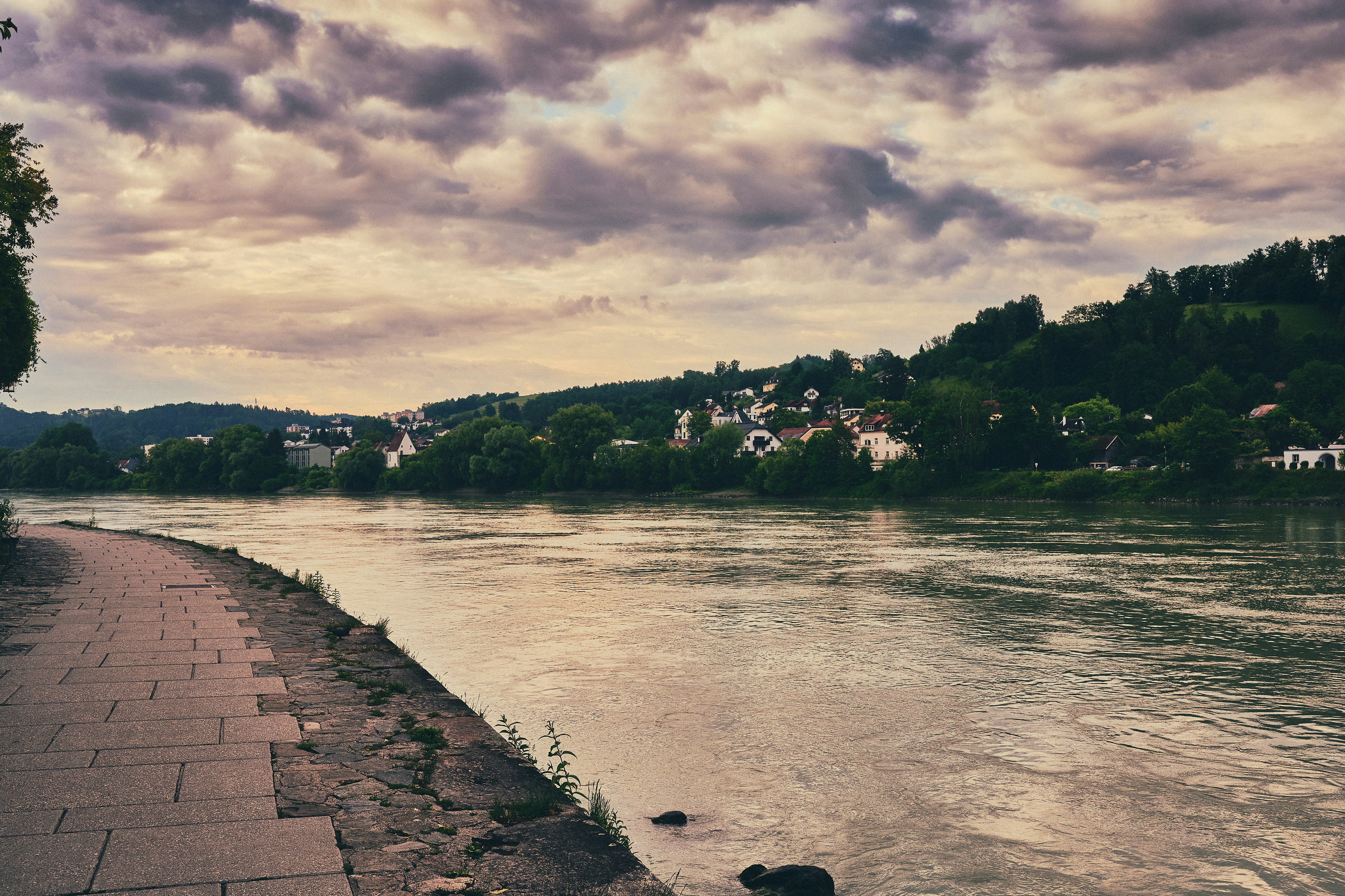 Riverside Path Toward a Quiet Horizon at Sunset