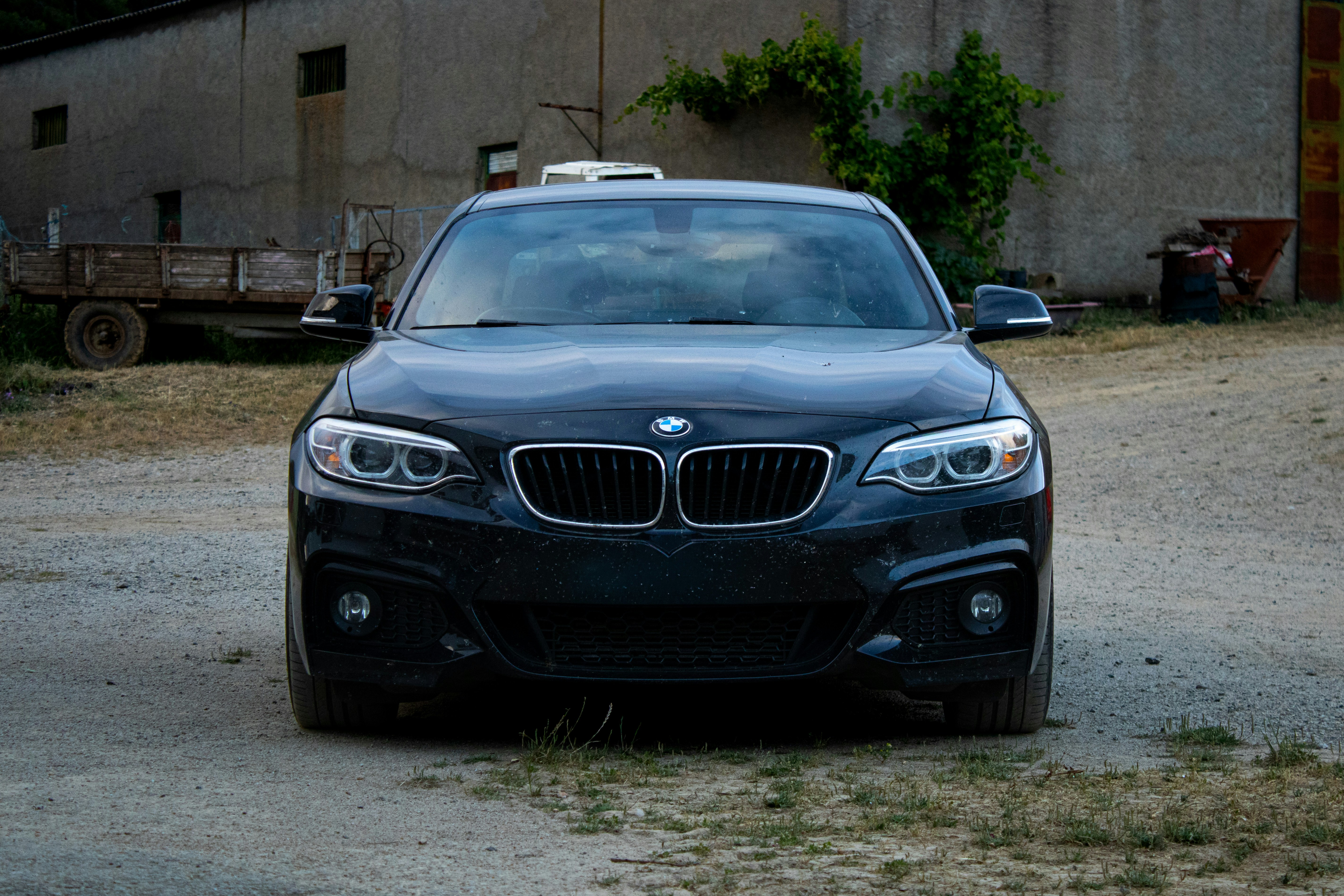 Front-and-center BMW: A Sturdy Black Sedan Awaiting Motion