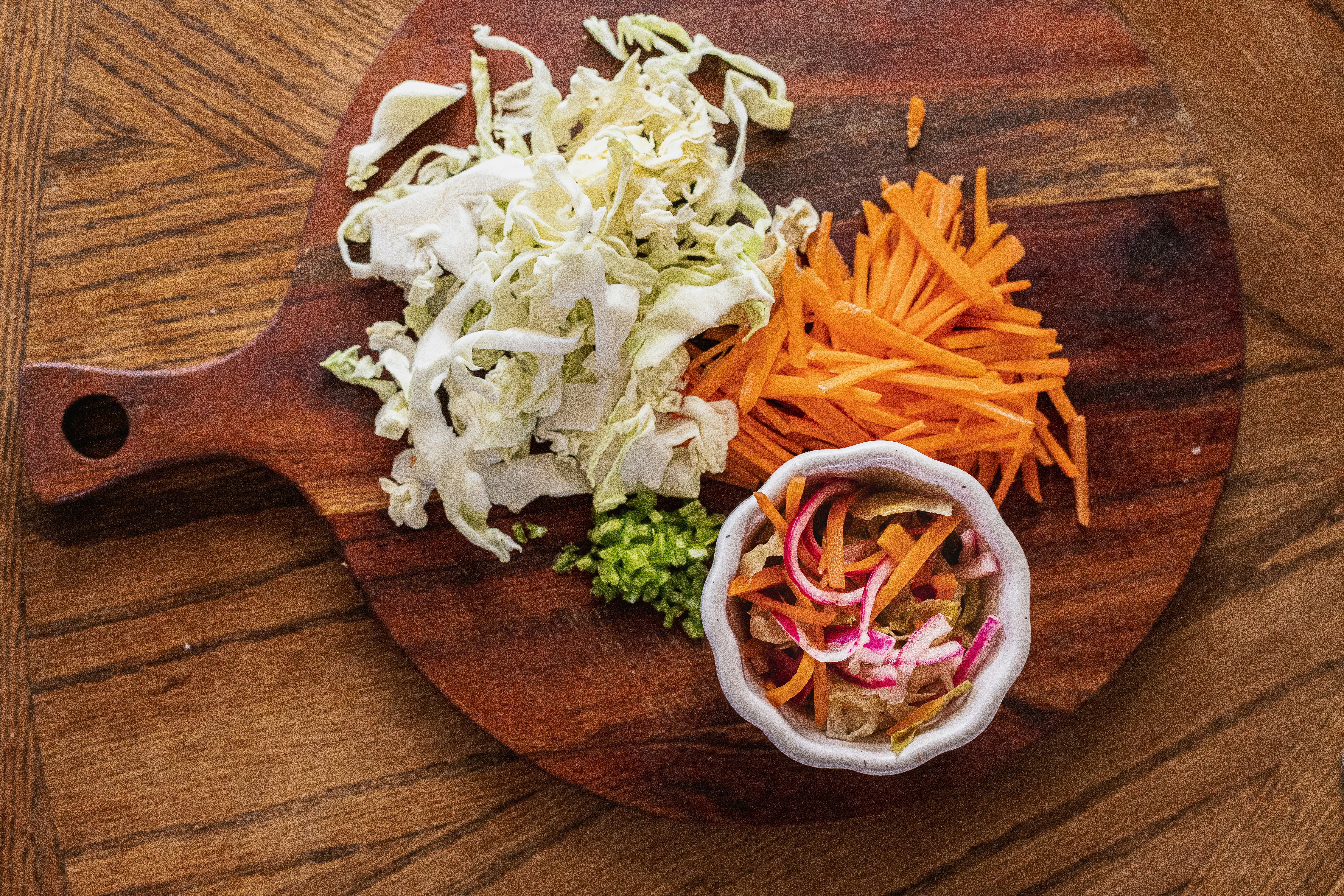 Colorful Shreds on a Wooden Board: A Culinary Still Life