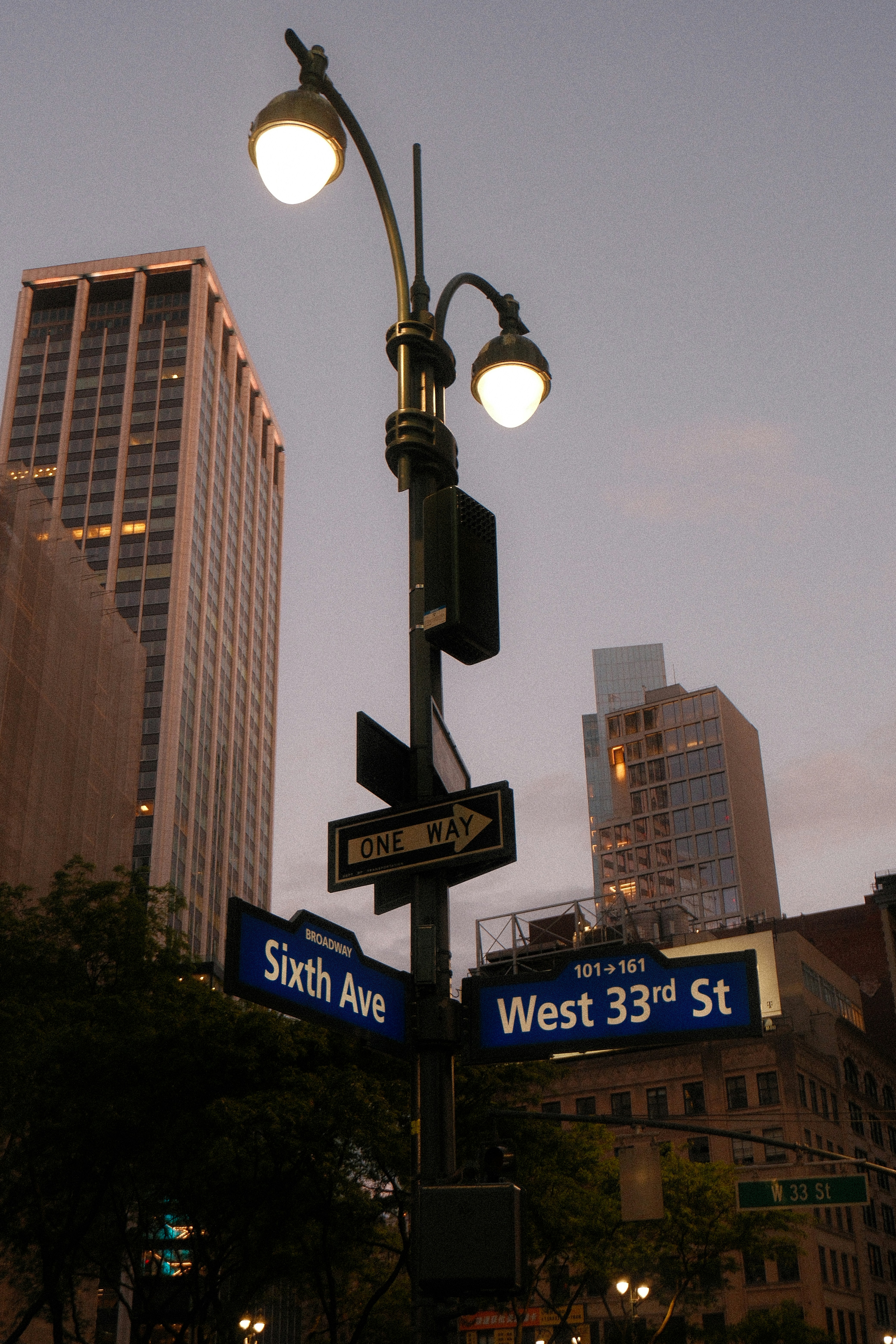 Urban Intersection: Neon Signs at Dusk