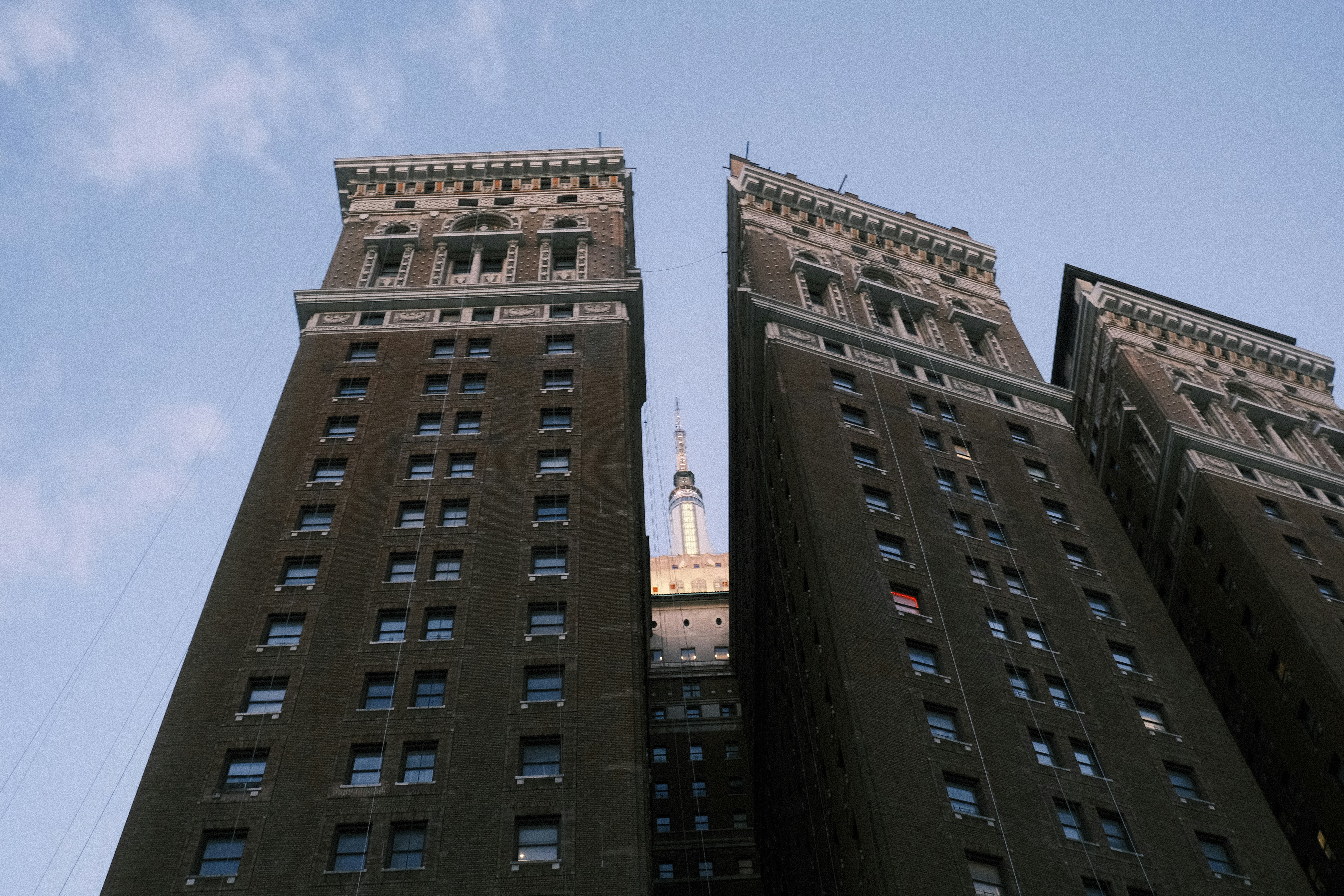 Twin Towers Reaching the Sky: A Narrow Gap Between Giants