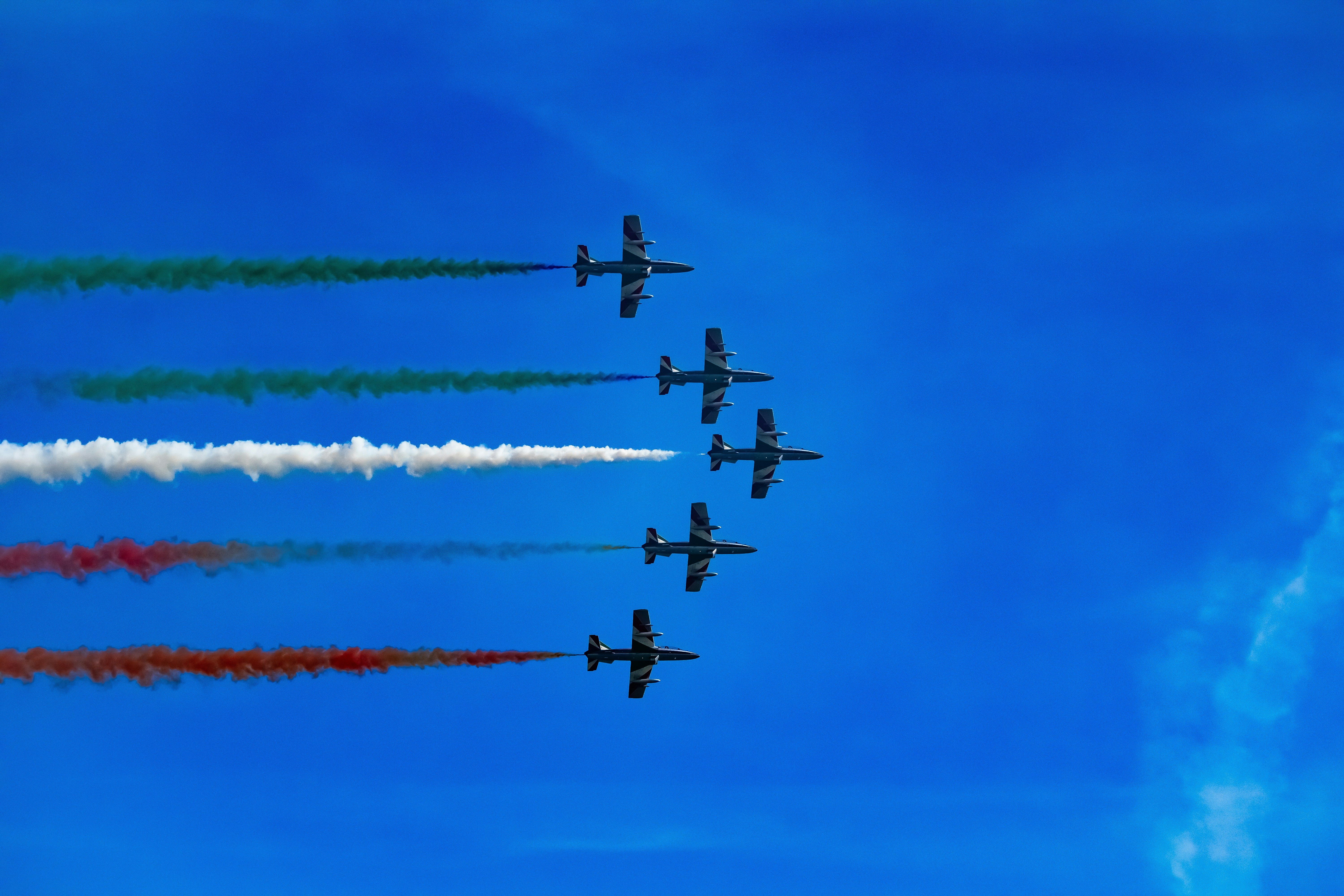 Five-Row Sky Parade: Painted Contrails in a Pristine Blue