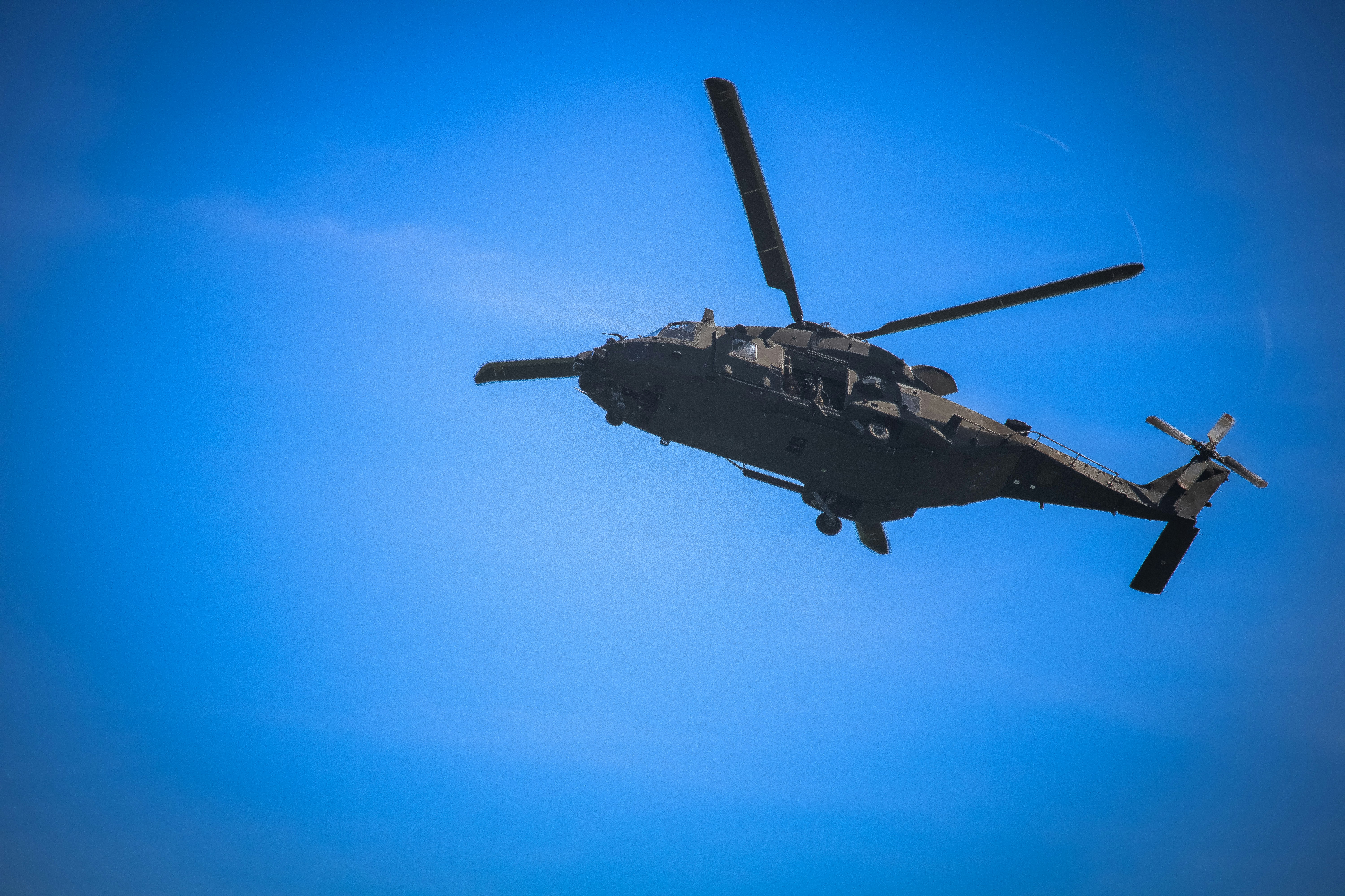 Low-Altitude Black Hawk in Clear Sky