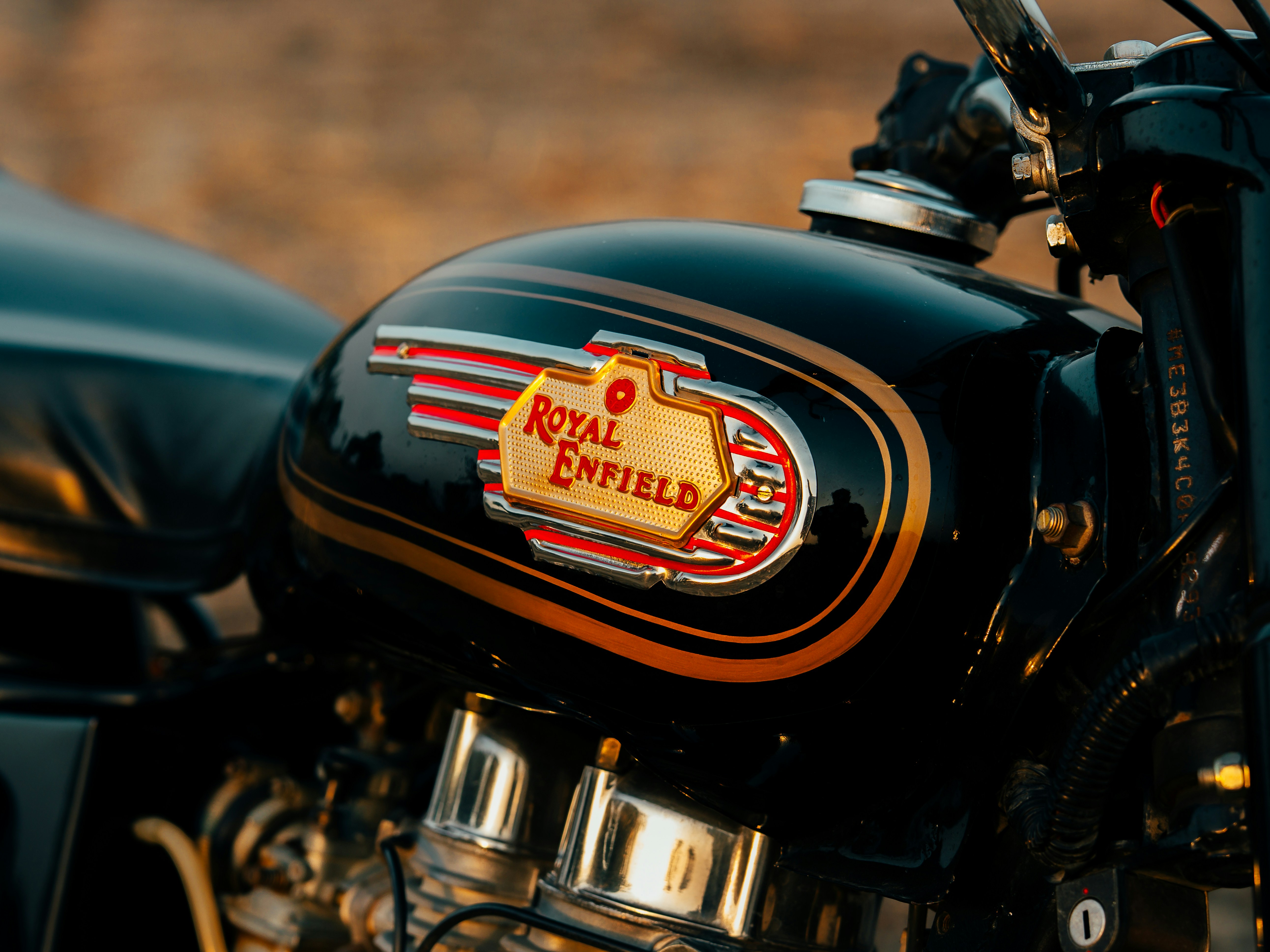 Royal Enfield Emblem on a Sleek Black Tank